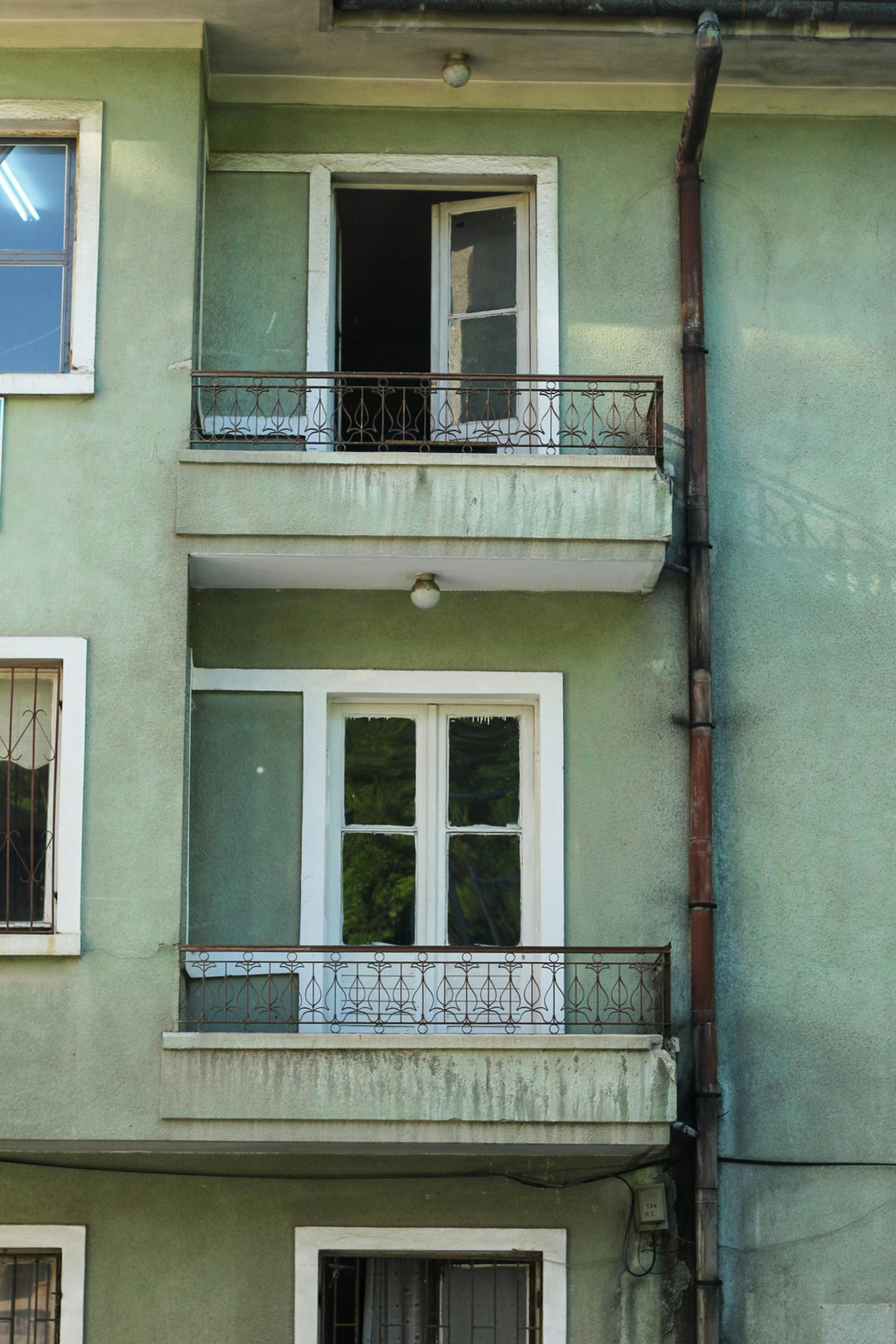 Balcony and Windows in House Building · Free Stock Photo