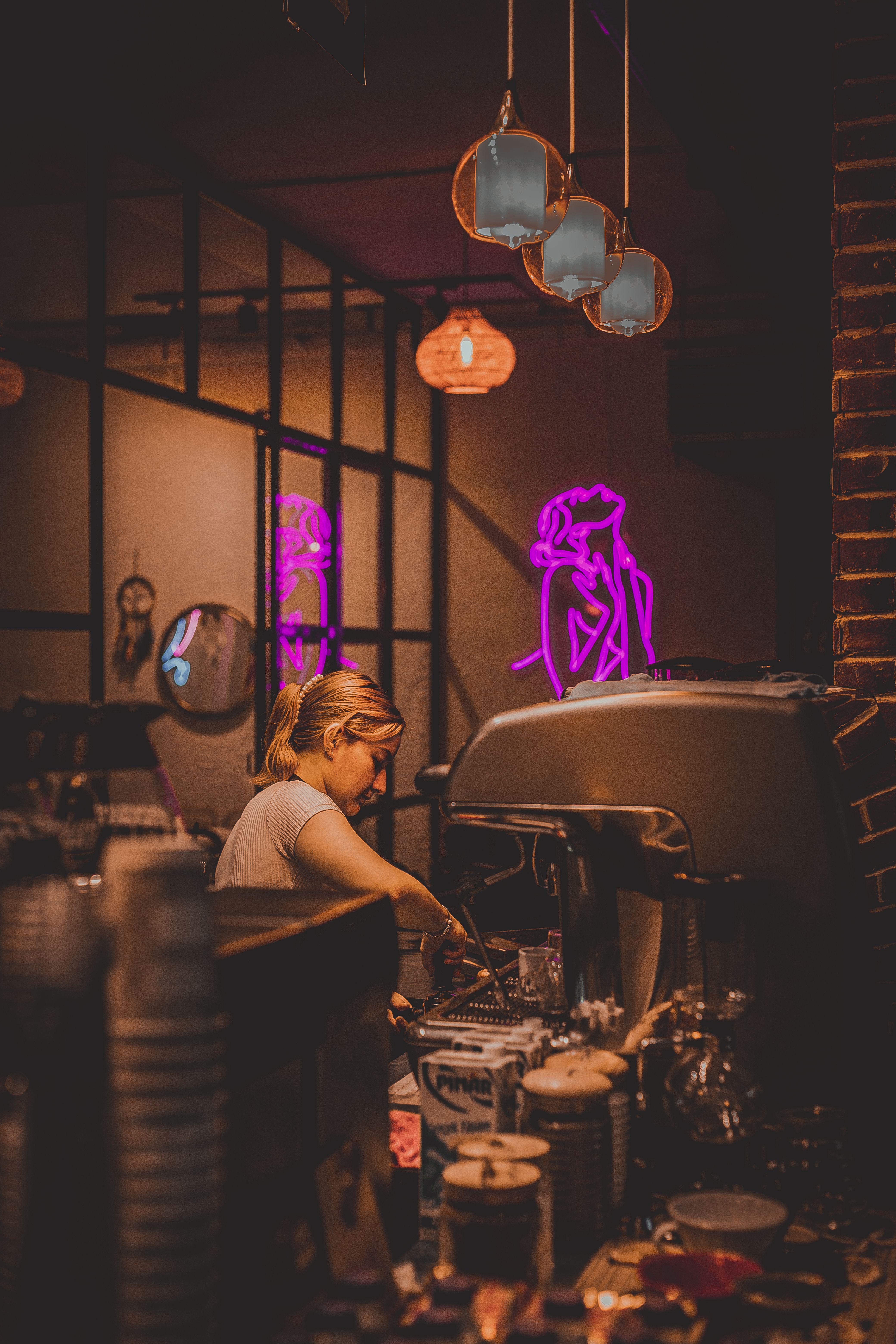 Bartender Behind Bar in Nightclub · Free Stock Photo