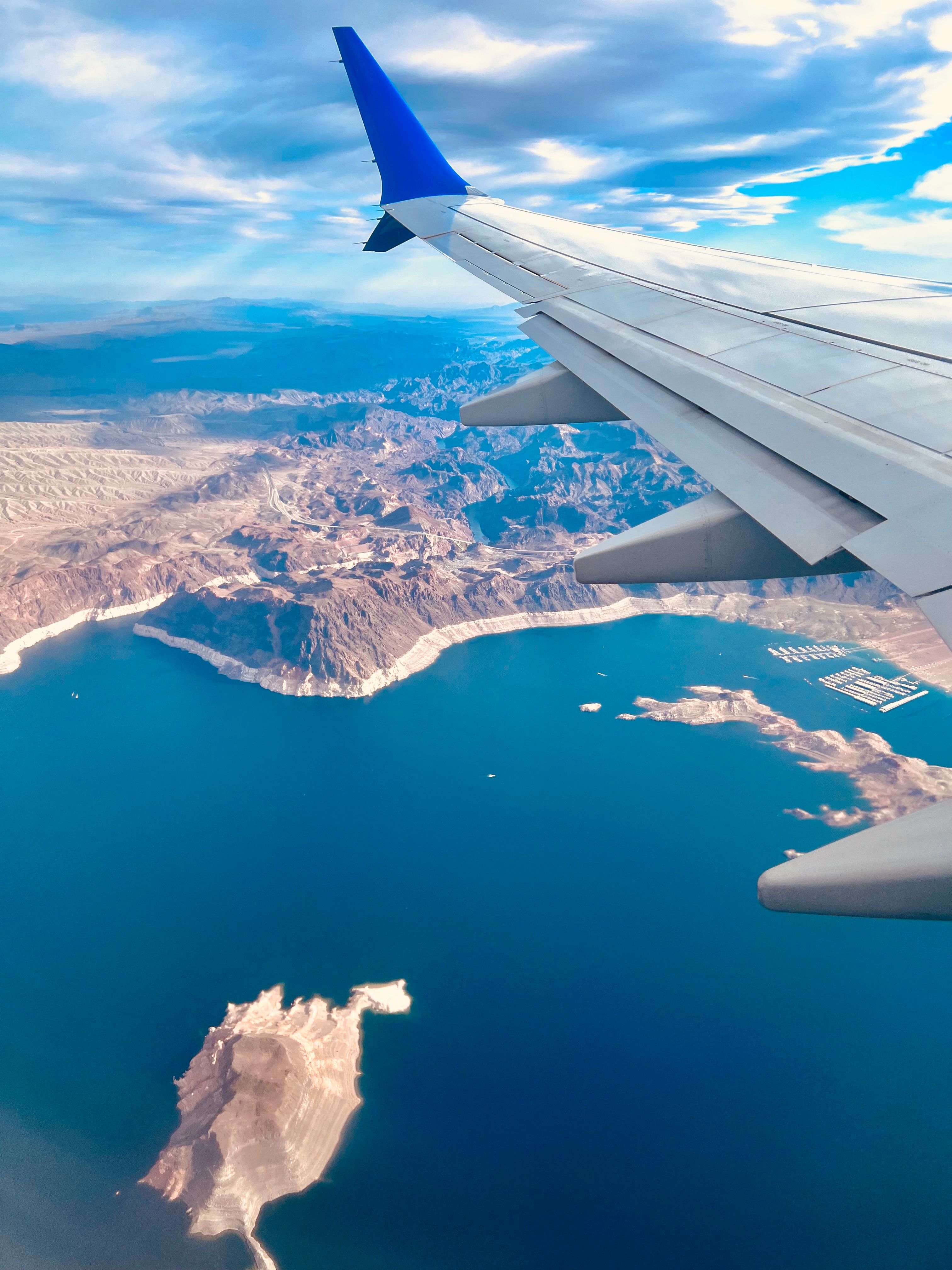 Airplane Wing and Landscape · Free Stock Photo