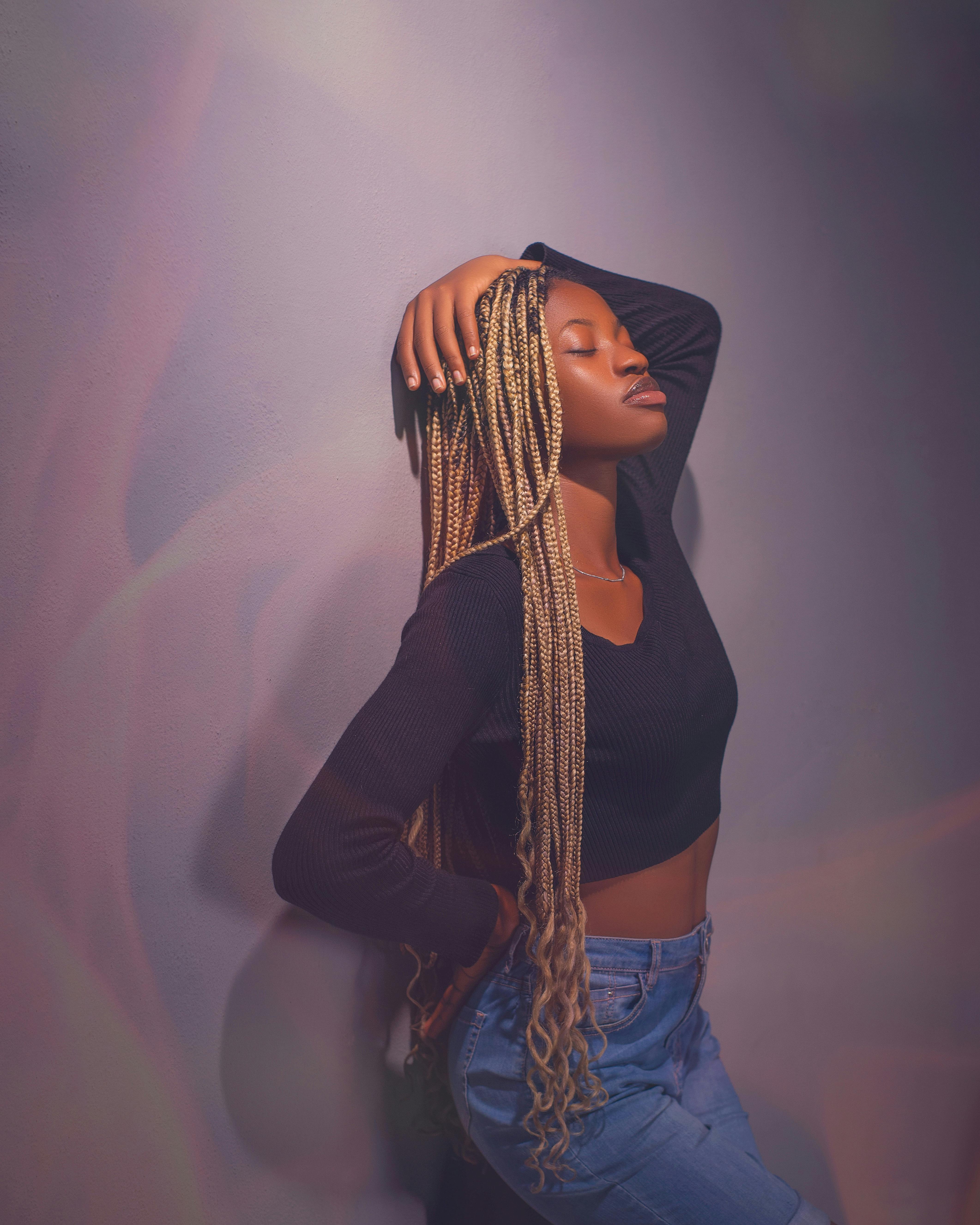 Model with Dreadlocks in Jeans · Free Stock Photo