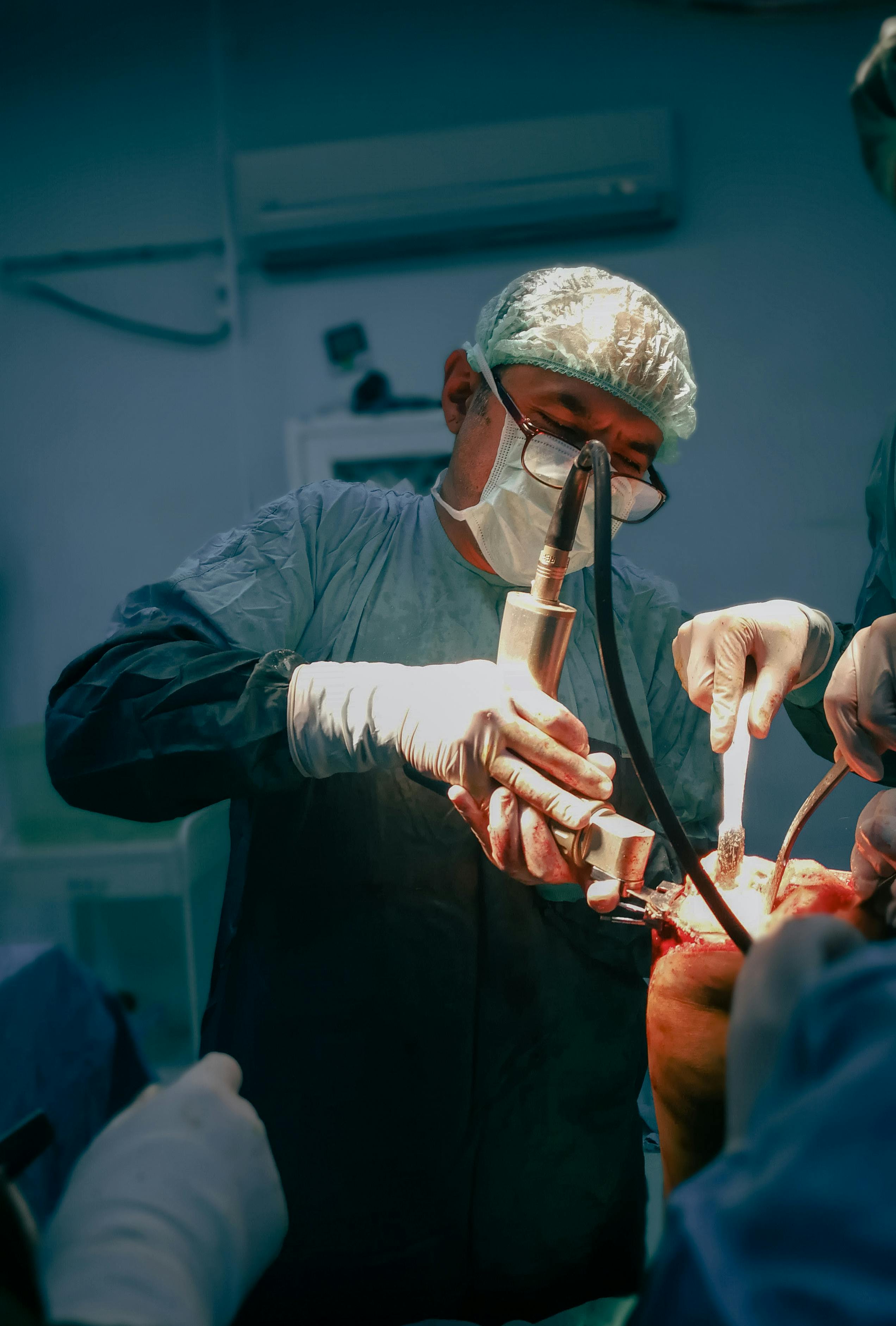 Surgeons Operating on a Patient · Free Stock Photo