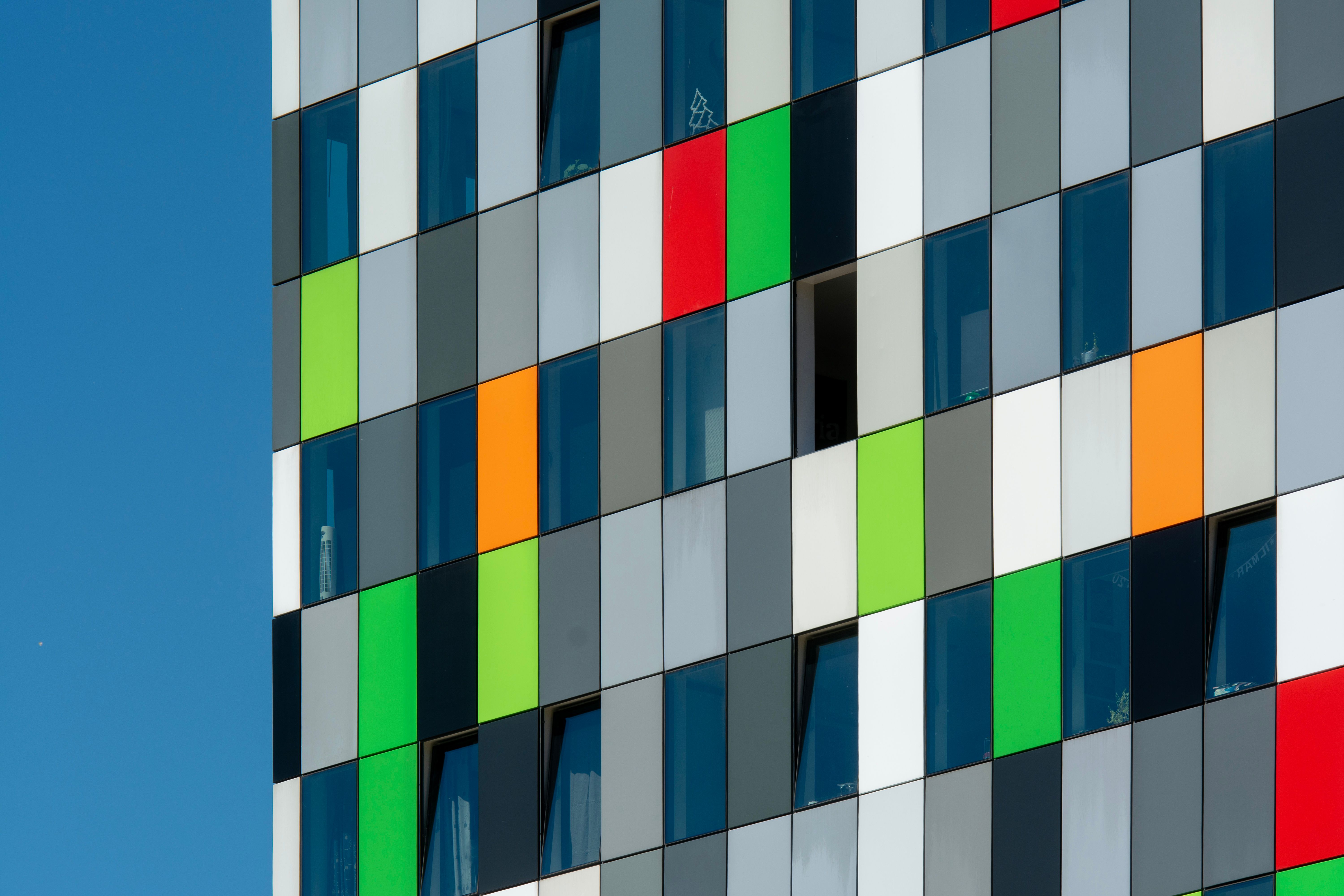 Multi Colored Checked Facade of Office Building · Free Stock Photo
