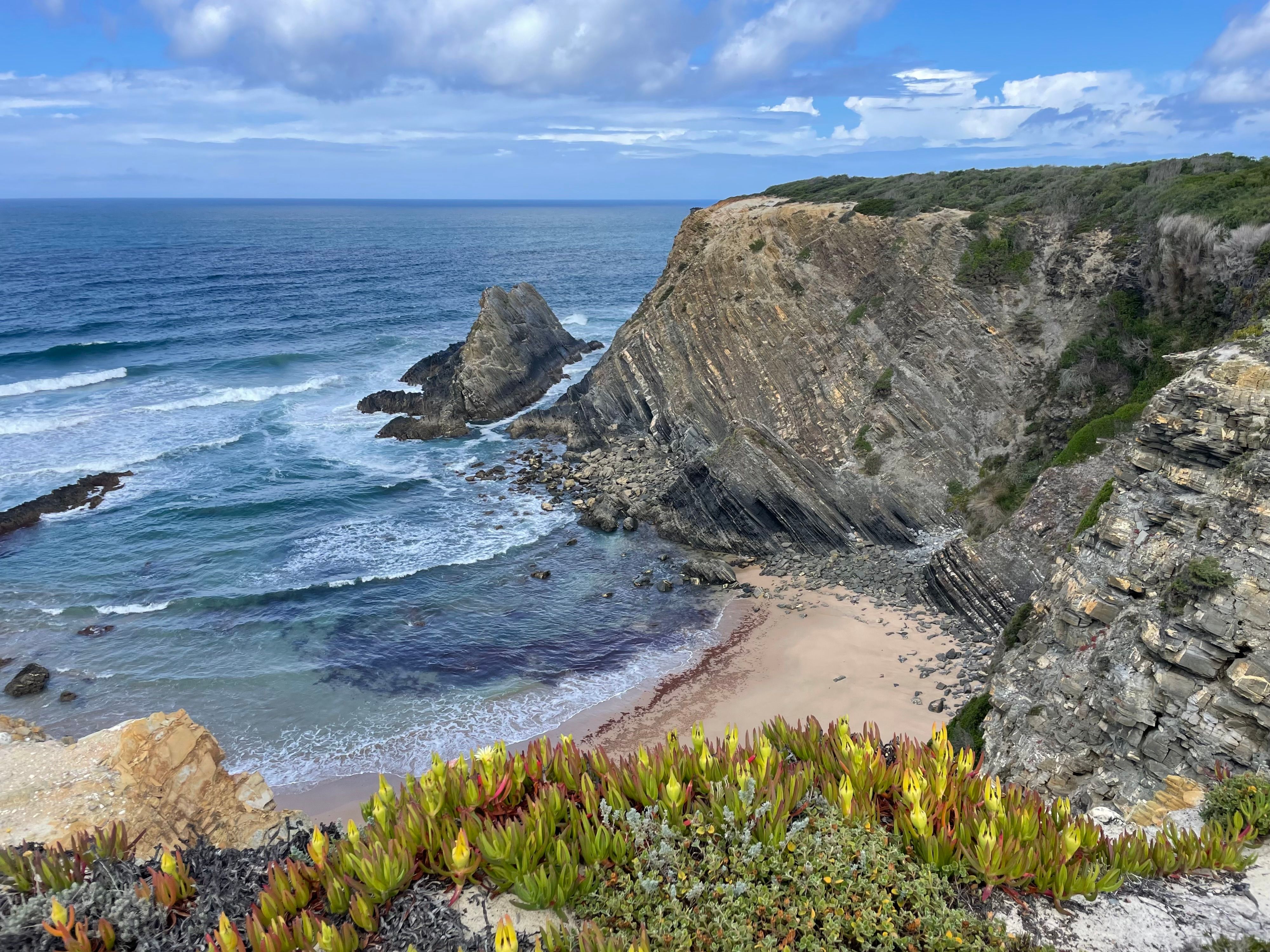 Terrace with View on Small Strait and Sandy Beach · Free Stock Photo