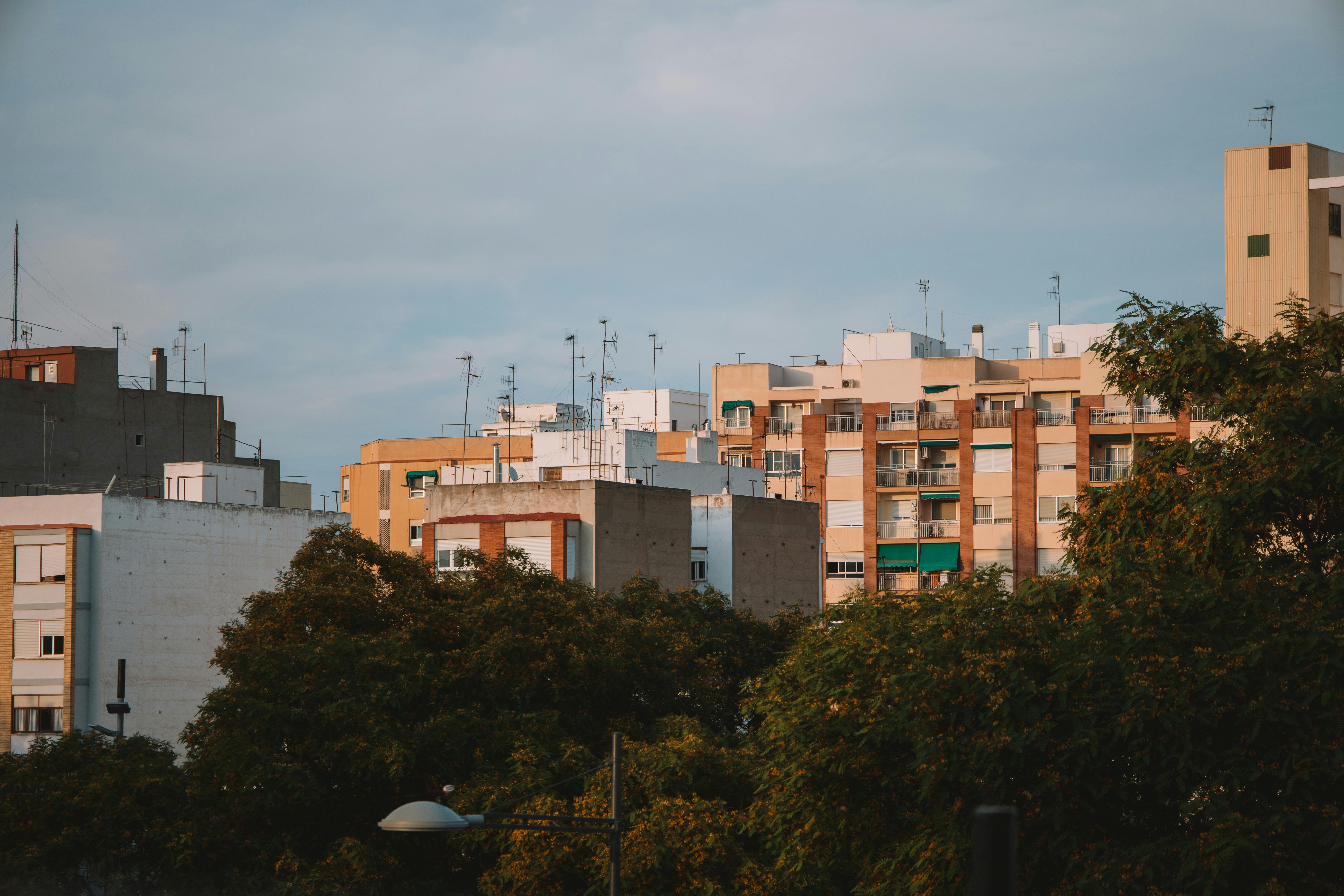 Overcast over Building with Windows · Free Stock Photo