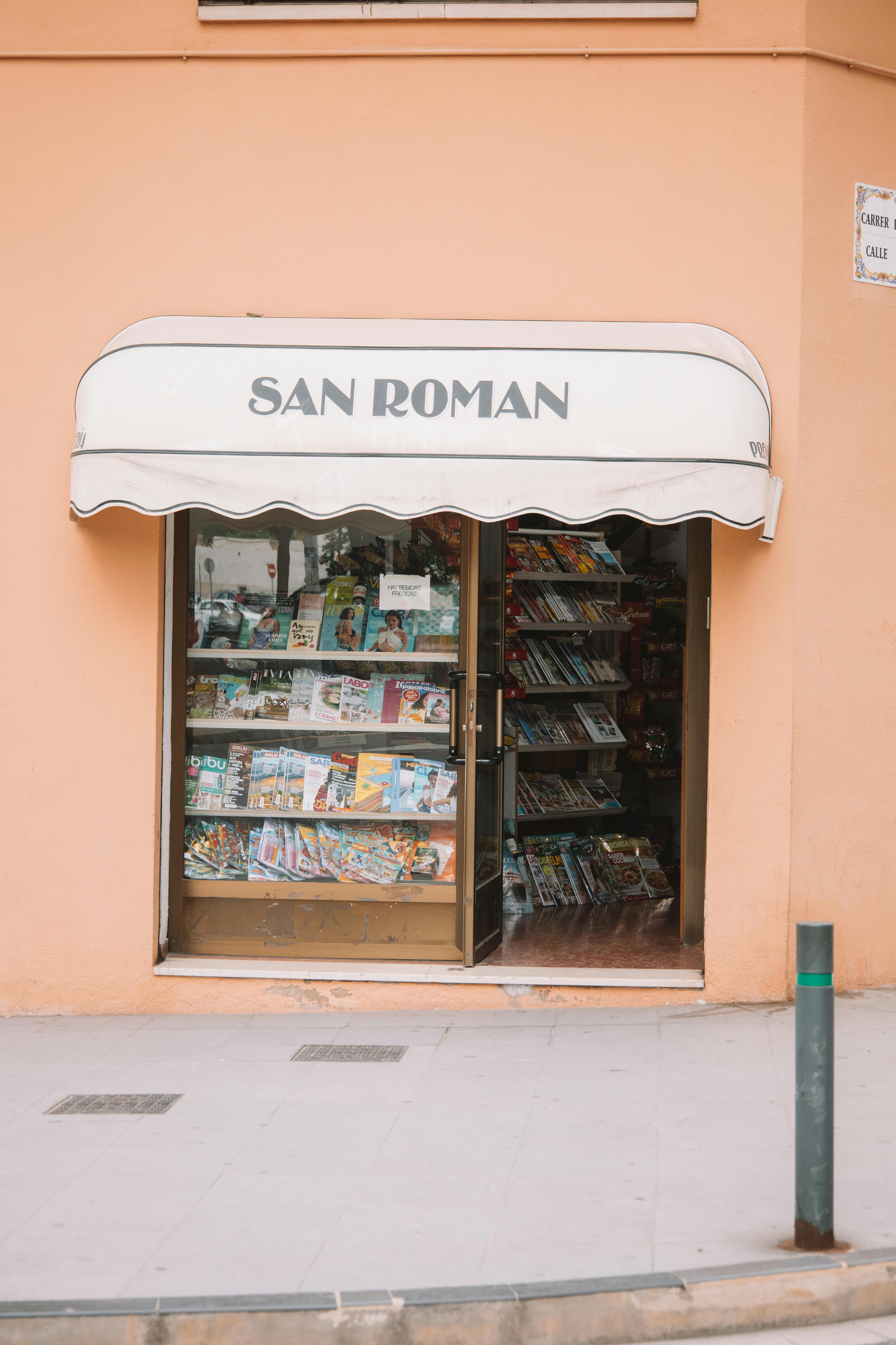 A Newspaper Stand on the Corner of the Street · Free Stock Photo