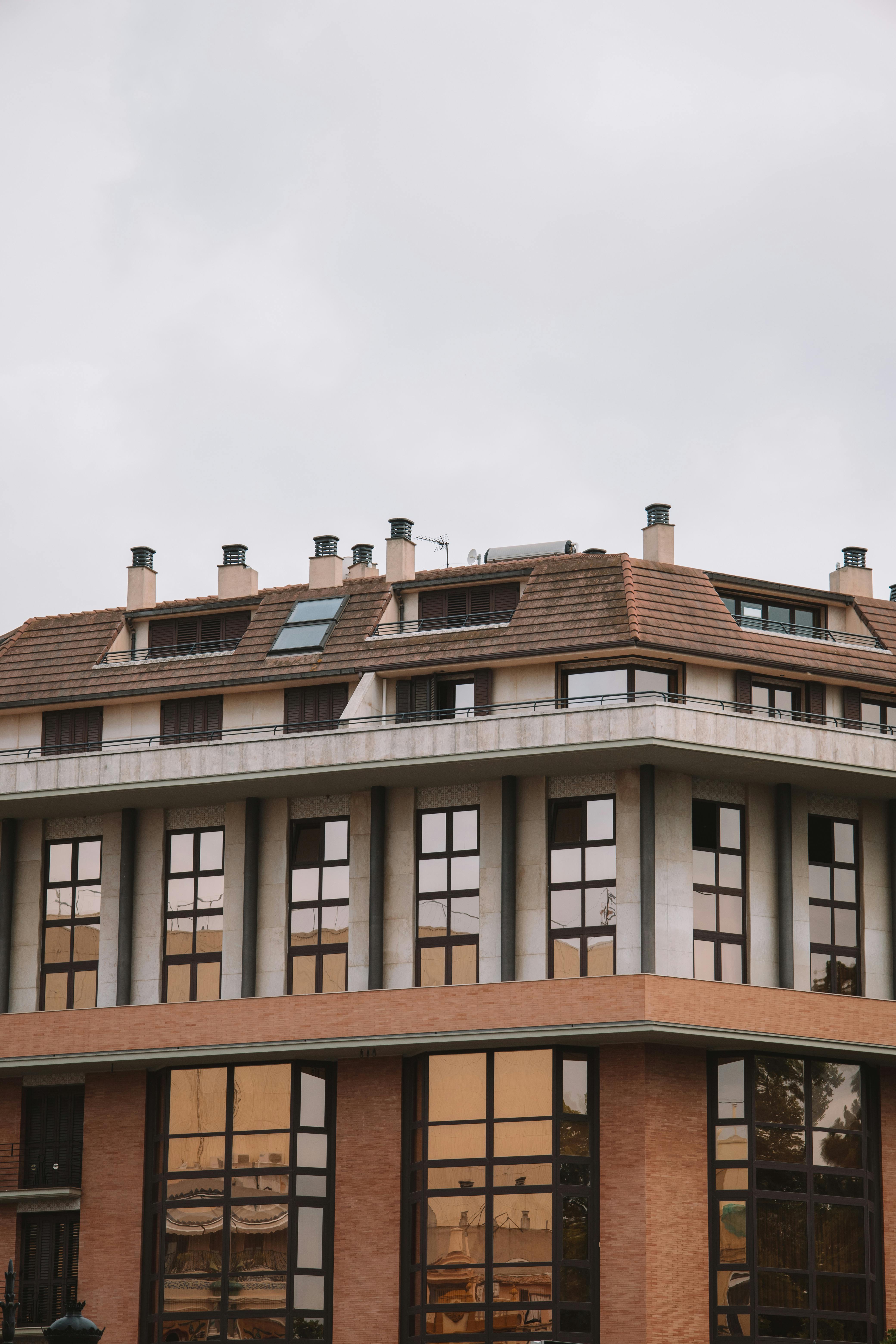 Overcast over Building with Windows · Free Stock Photo