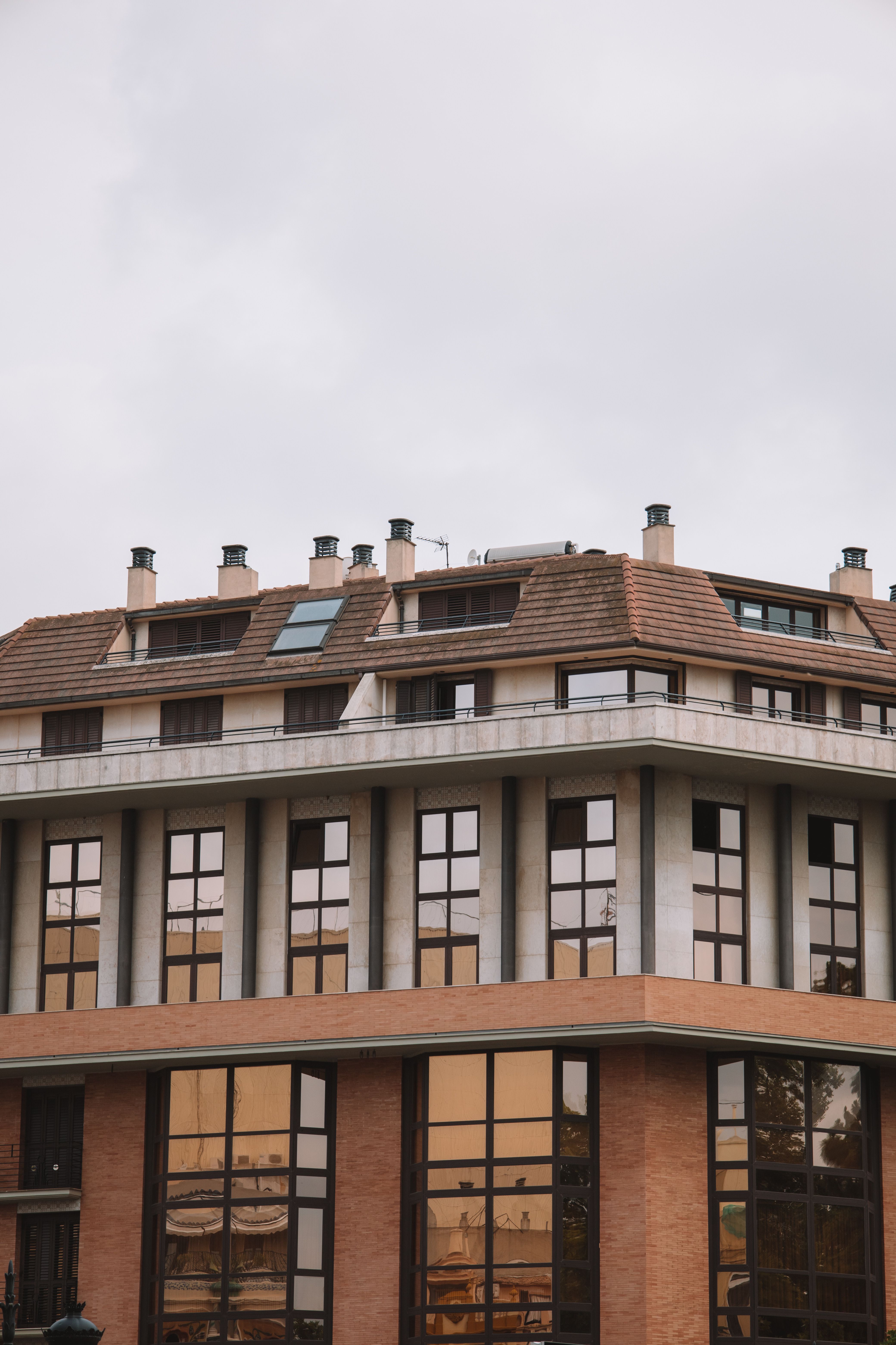 Overcast over Building with Windows · Free Stock Photo