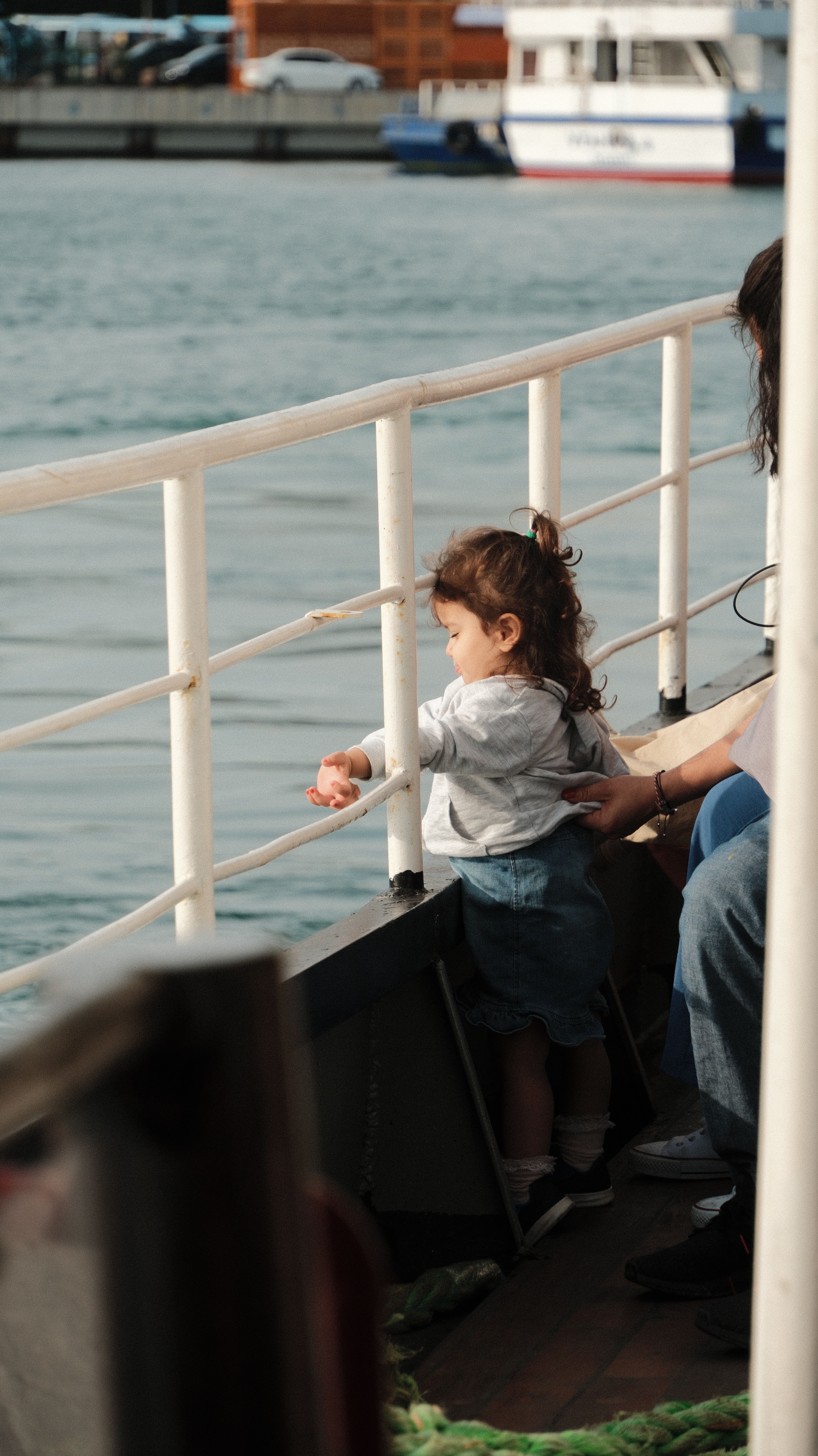 Girl Travelling on a Cruise Ship Looking at Sea · Free Stock Photo