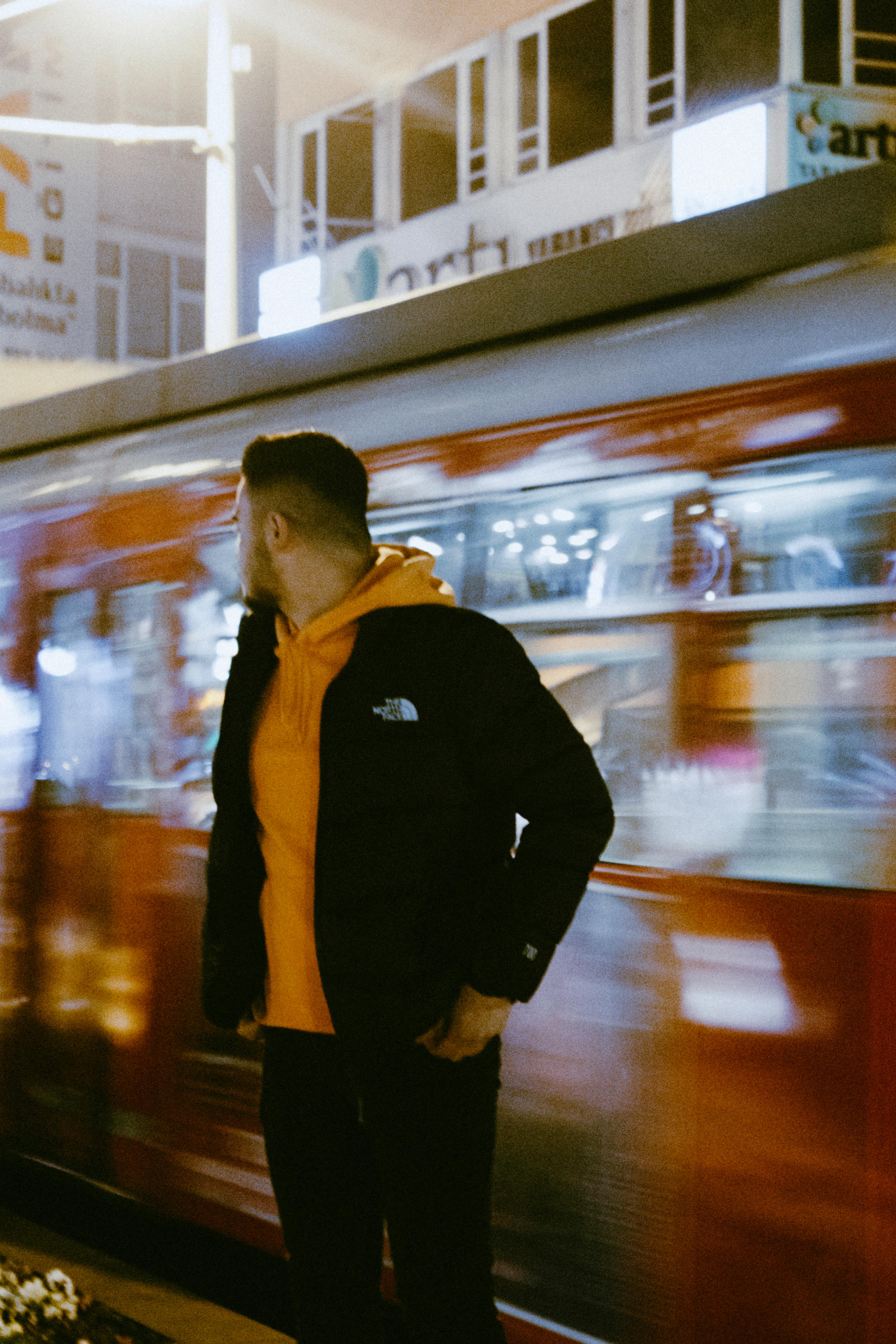 Man Standing at a Subway Station Platform · Free Stock Photo