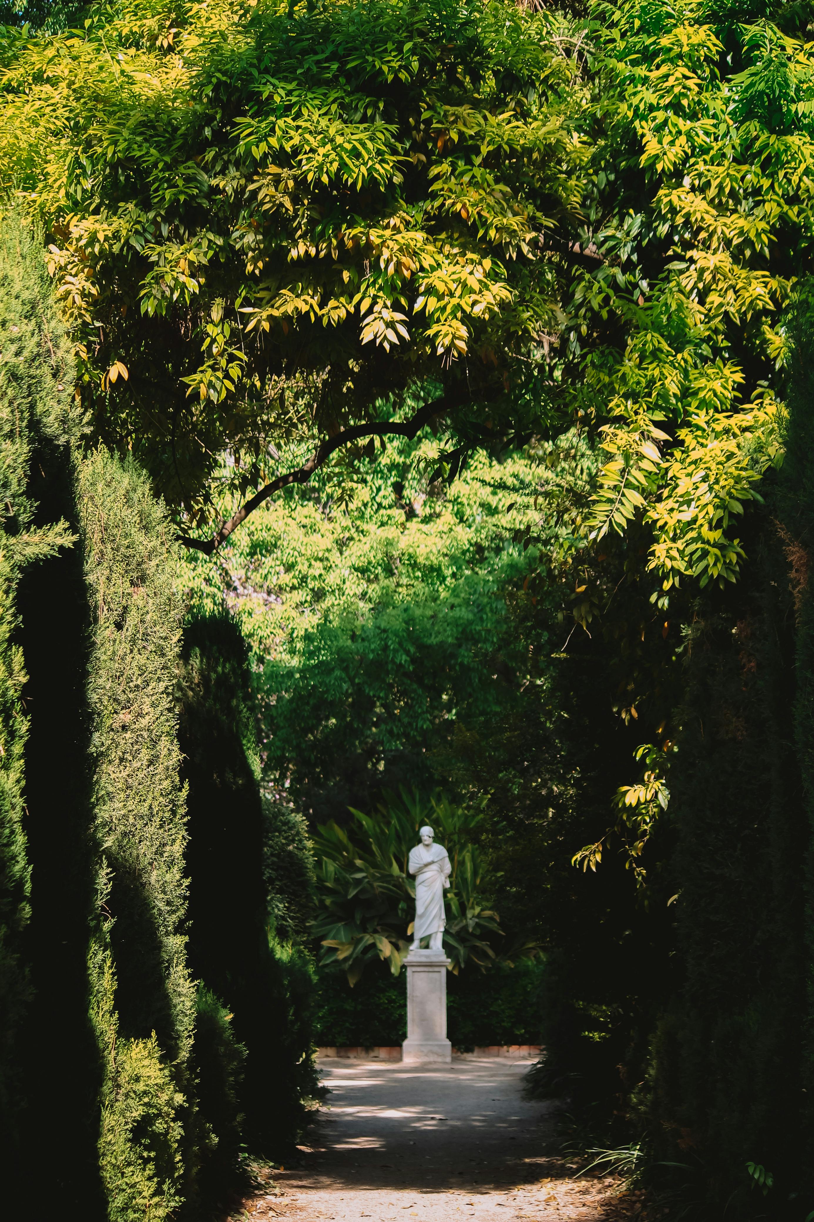 Statue Standing at the end of Path in Park · Free Stock Photo