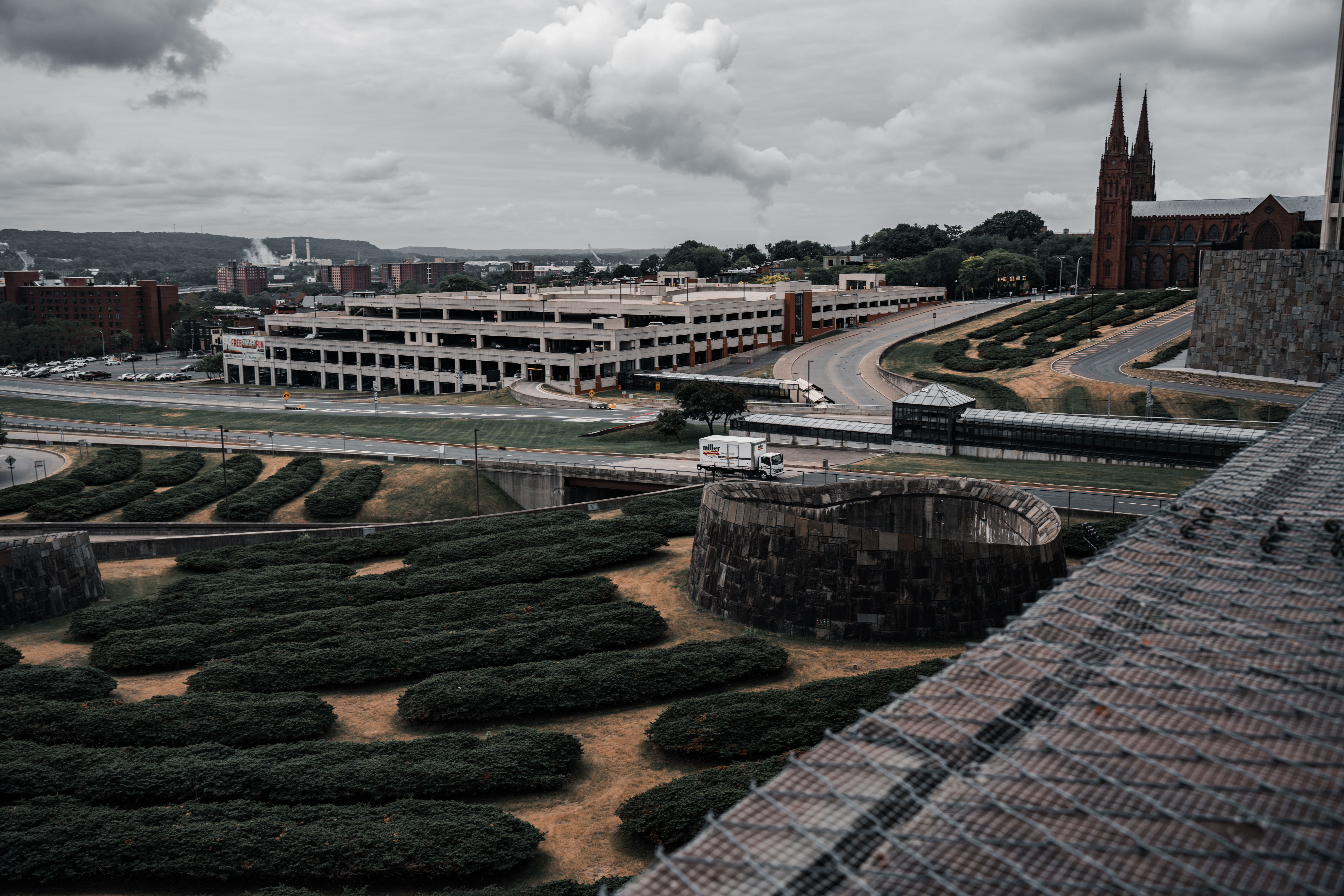 A view of a city from a hilltop with a castle in the background · Free ...
