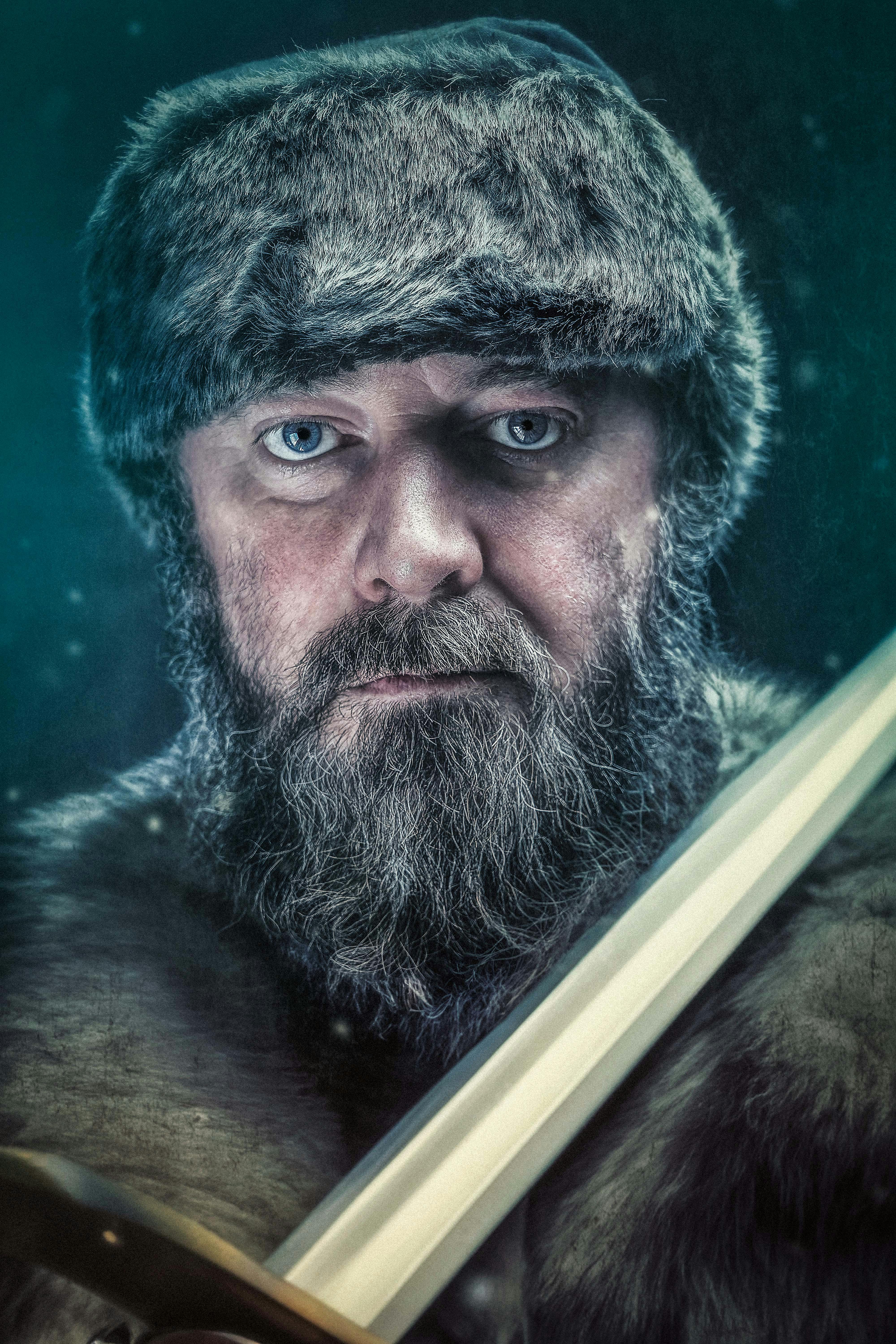 Man with Beard and Sword · Free Stock Photo