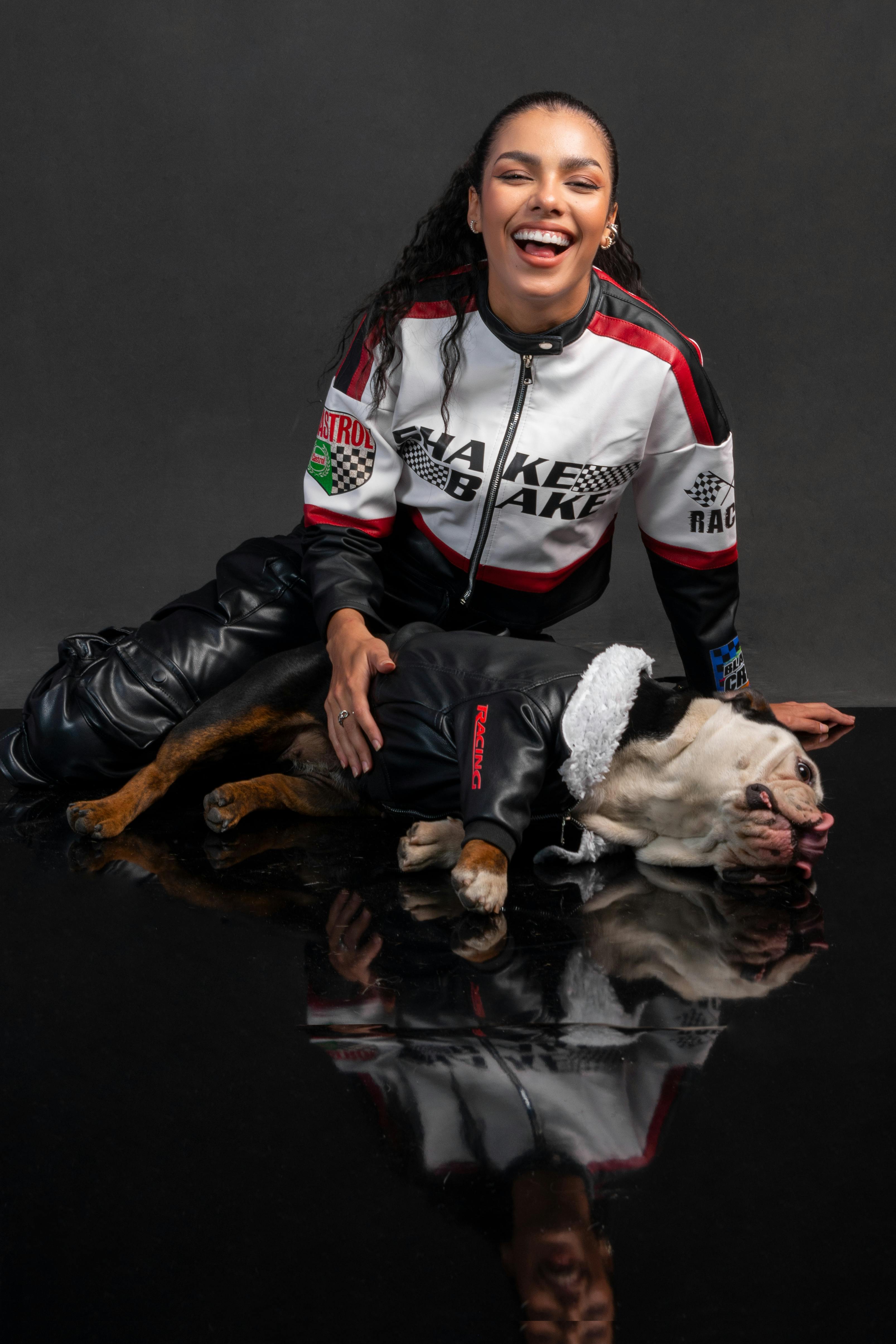 Brunette Woman in Racing Suit · Free Stock Photo