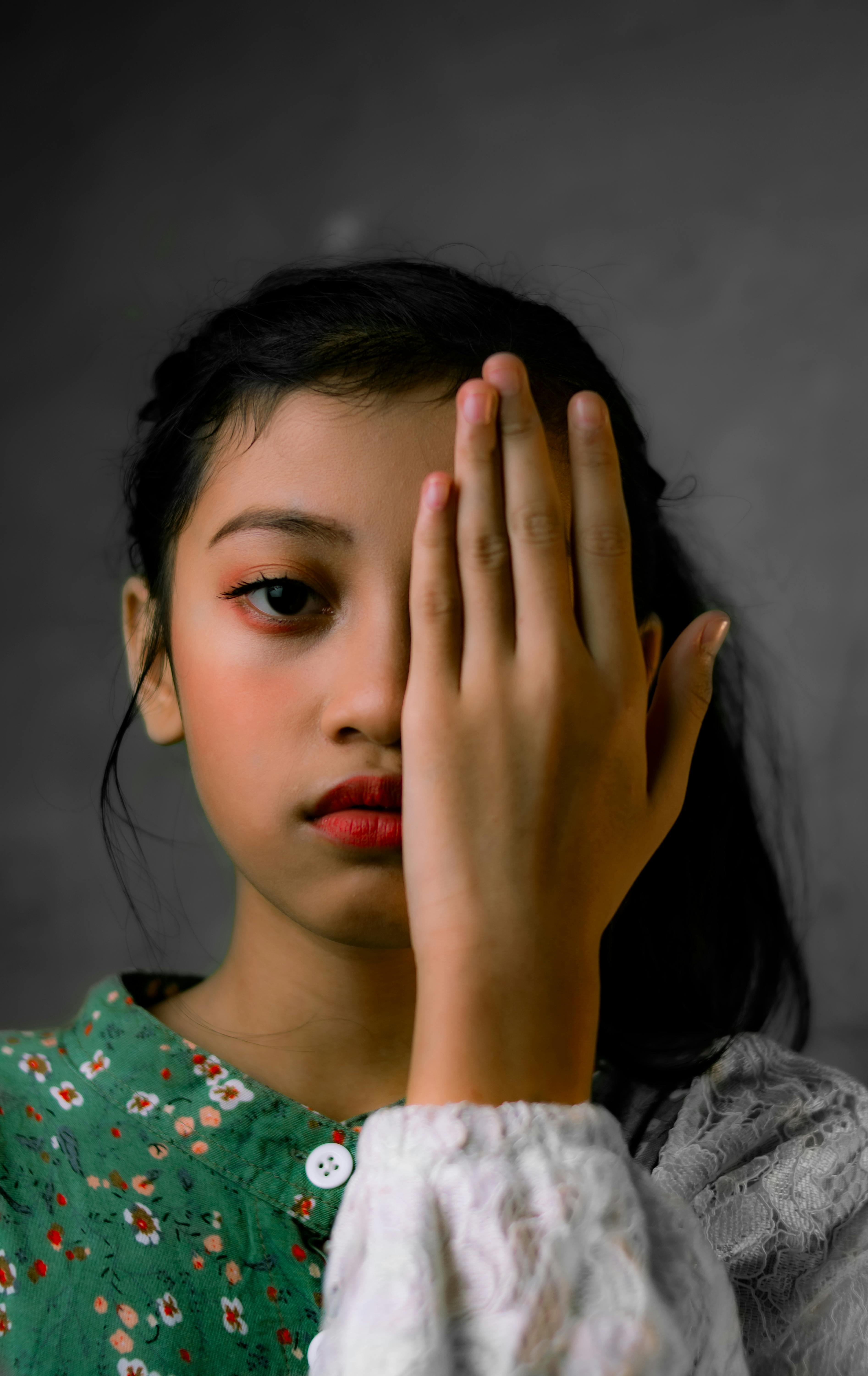 Portrait of Girl with Hand on Face · Free Stock Photo