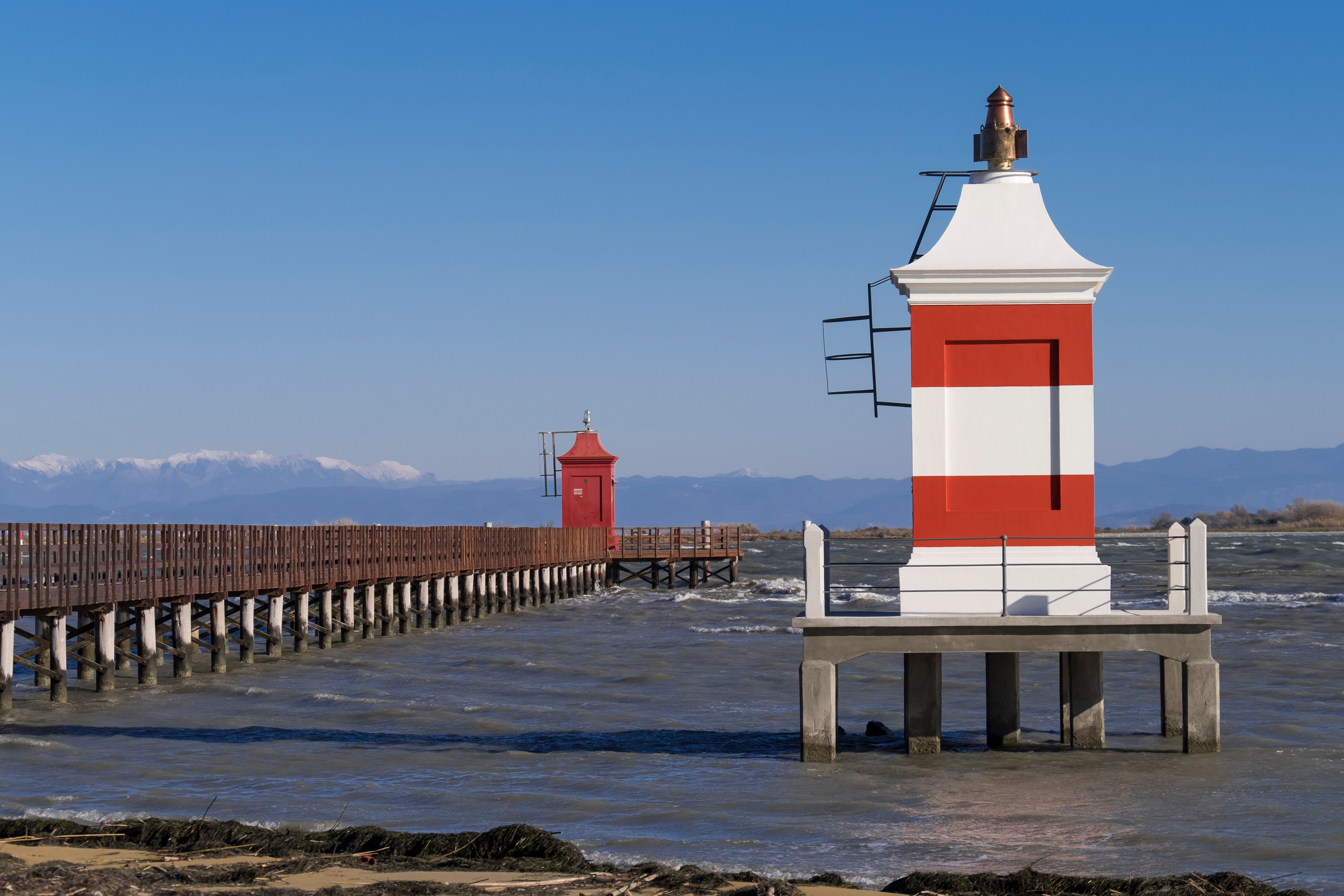 Lighthouse on a Beach · Free Stock Photo