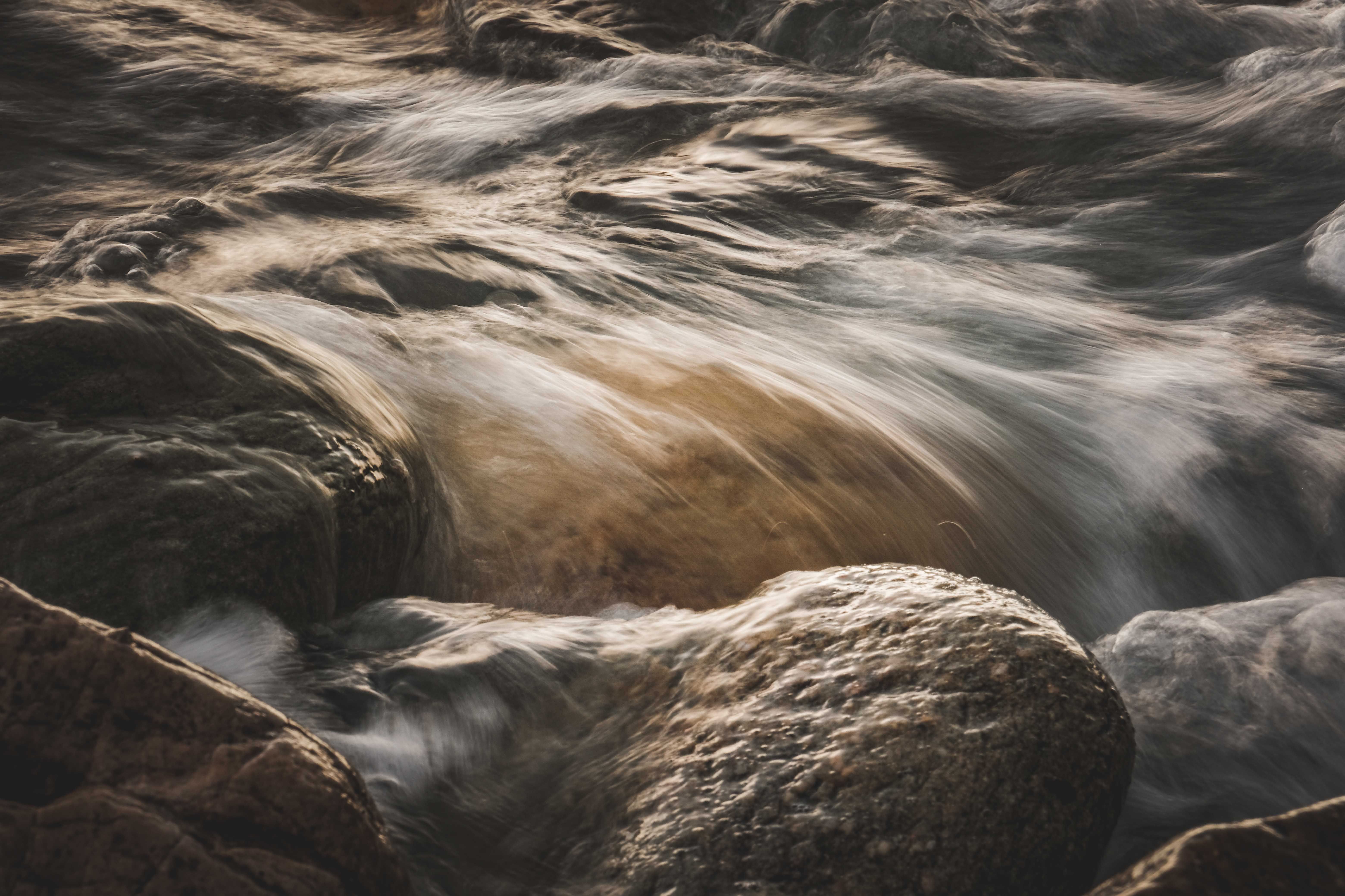Long Exposure Shot of Rocks and Sea Waves · Free Stock Photo