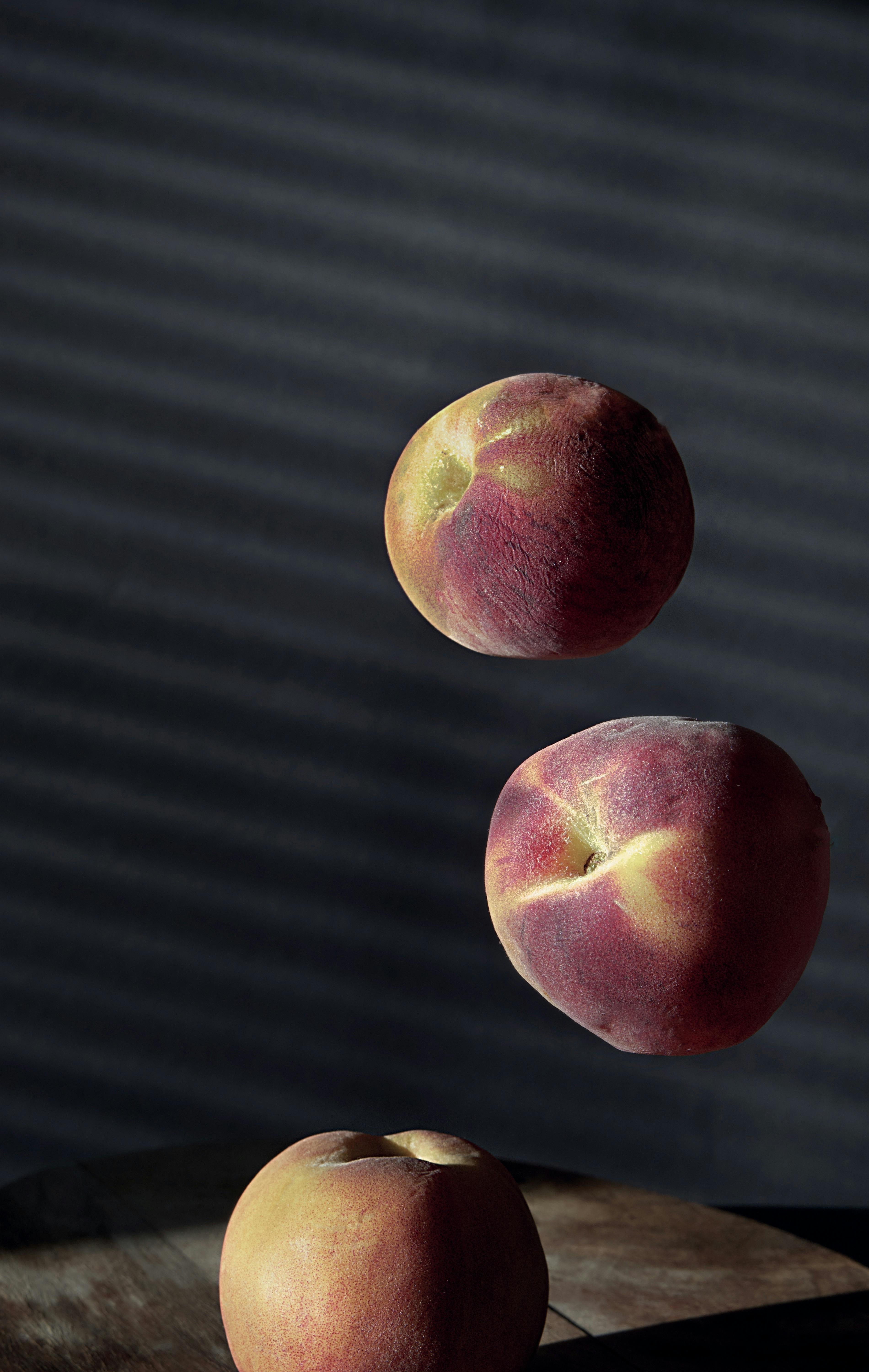 Close up of Flying Peaches · Free Stock Photo