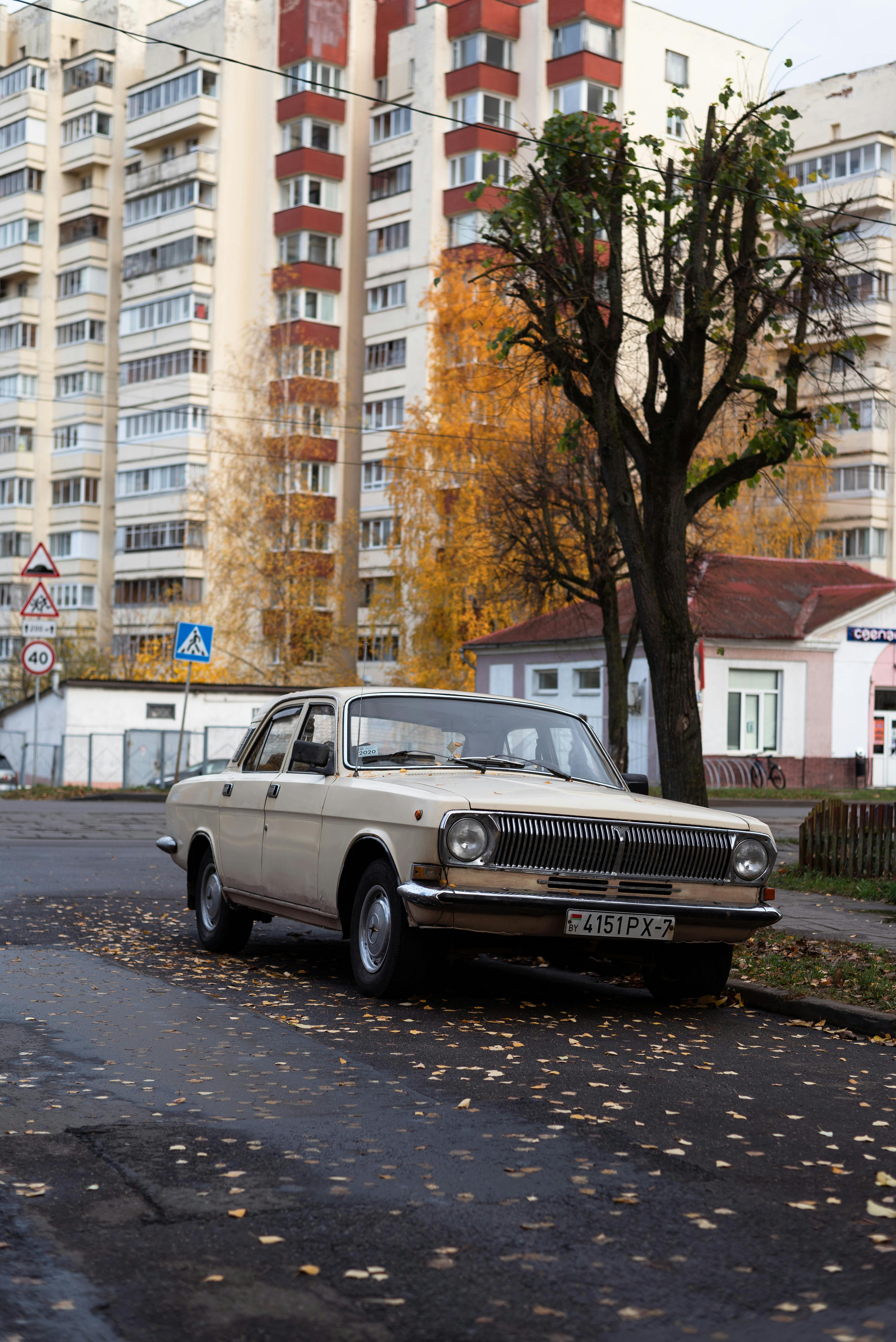 A Vintage GAZ-24 Volga Car Parked on the Street in City in Autumn ...