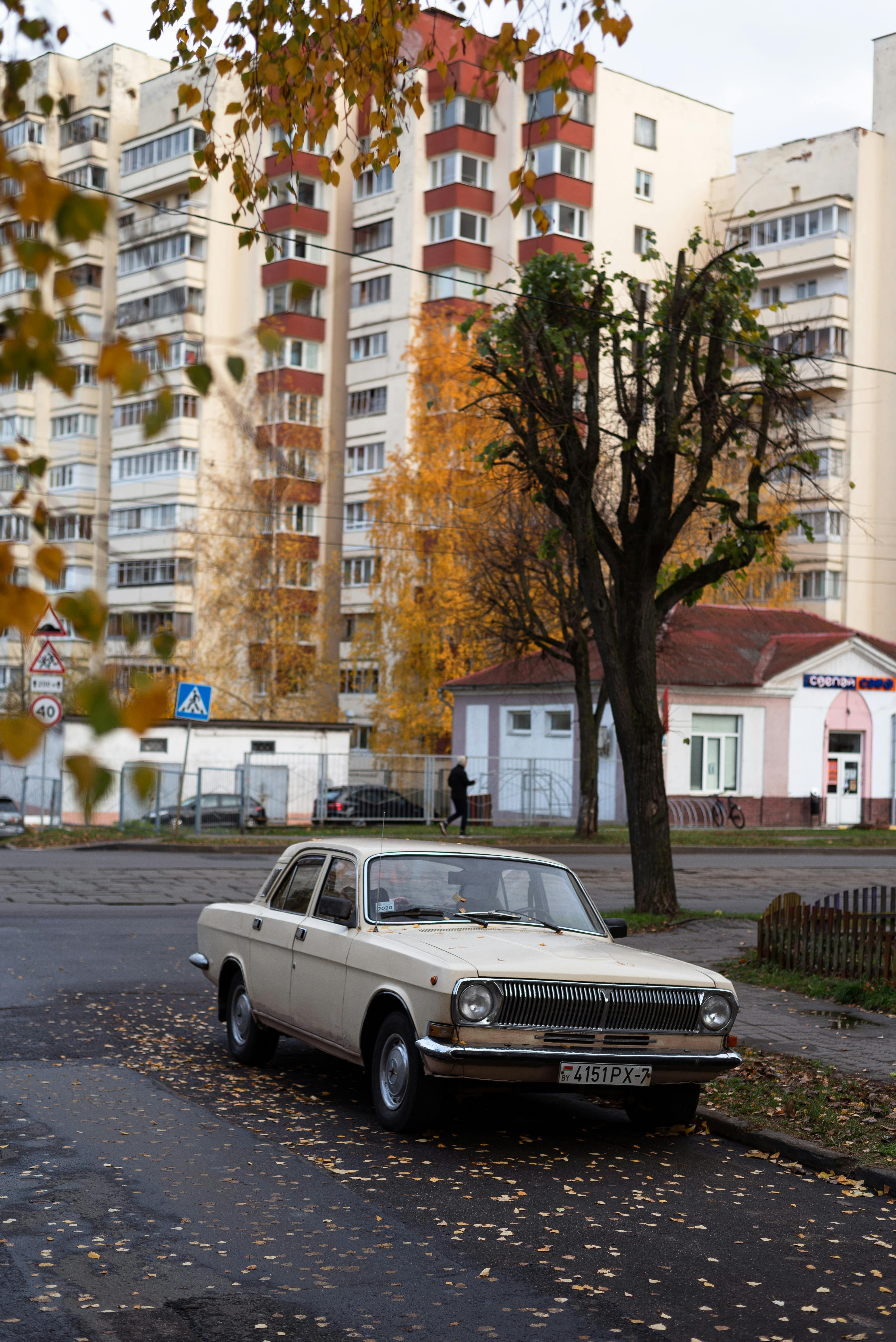 A Vintage GAZ-24 Volga Car Parked on the Street in City in Autumn ...