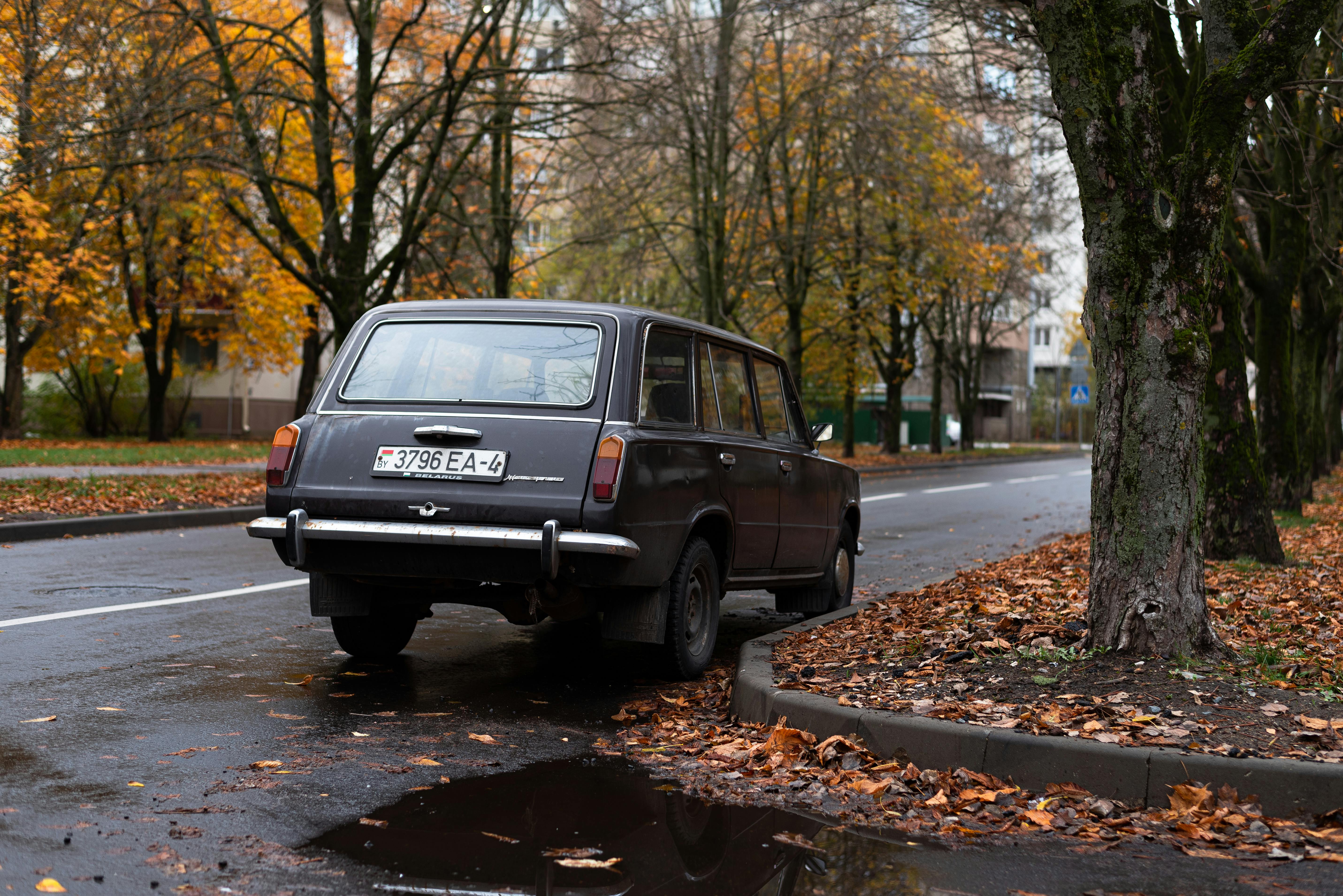 A Vintage VAZ-2101 Car Parked on the Street in City in Autumn · Free ...