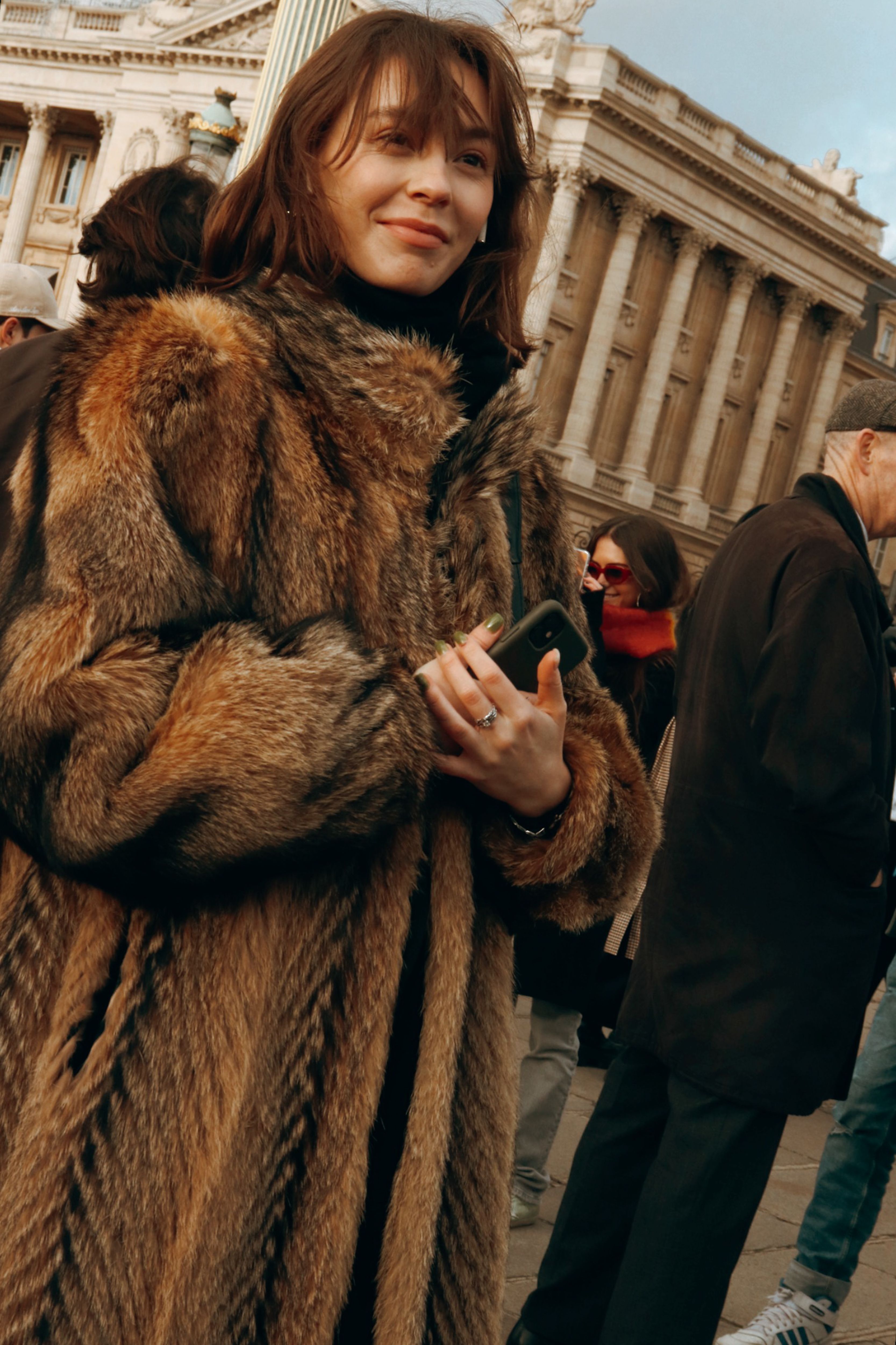 Selective Focus Photography Woman Wearing Gray Coat Standing Near
