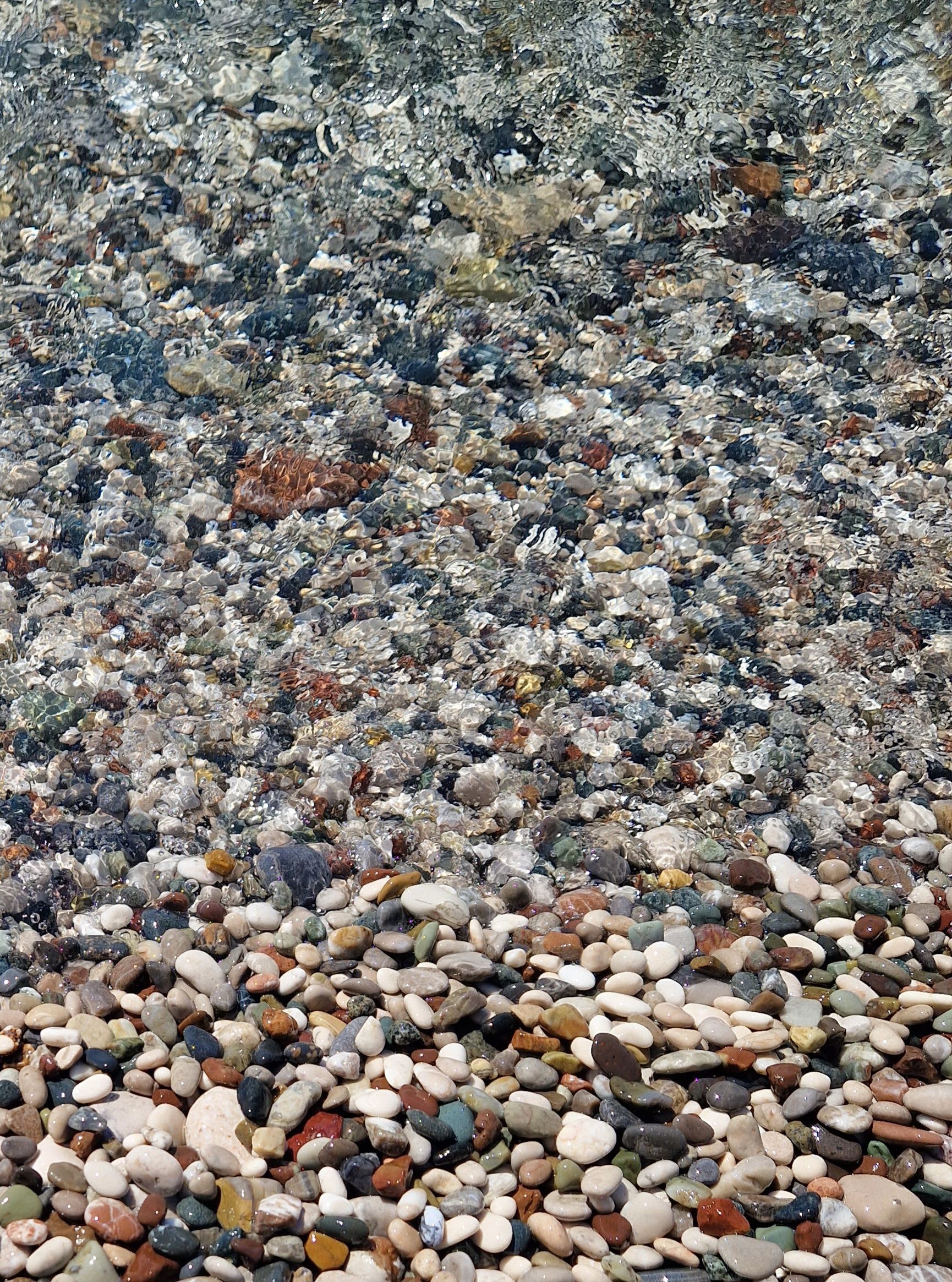 Multi Colored River Stones · Free Stock Photo