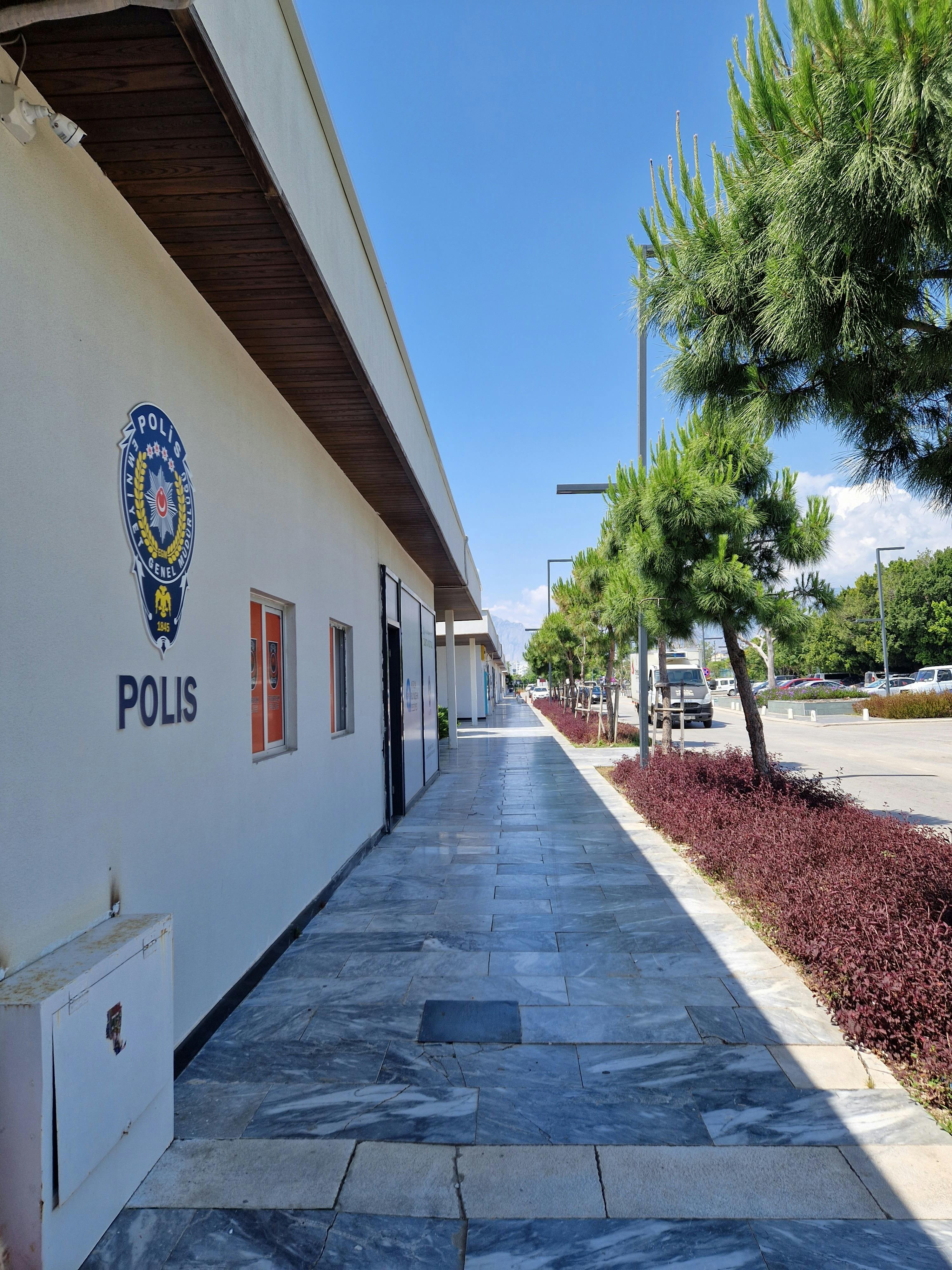 A Sidewalk by a Police Station · Free Stock Photo