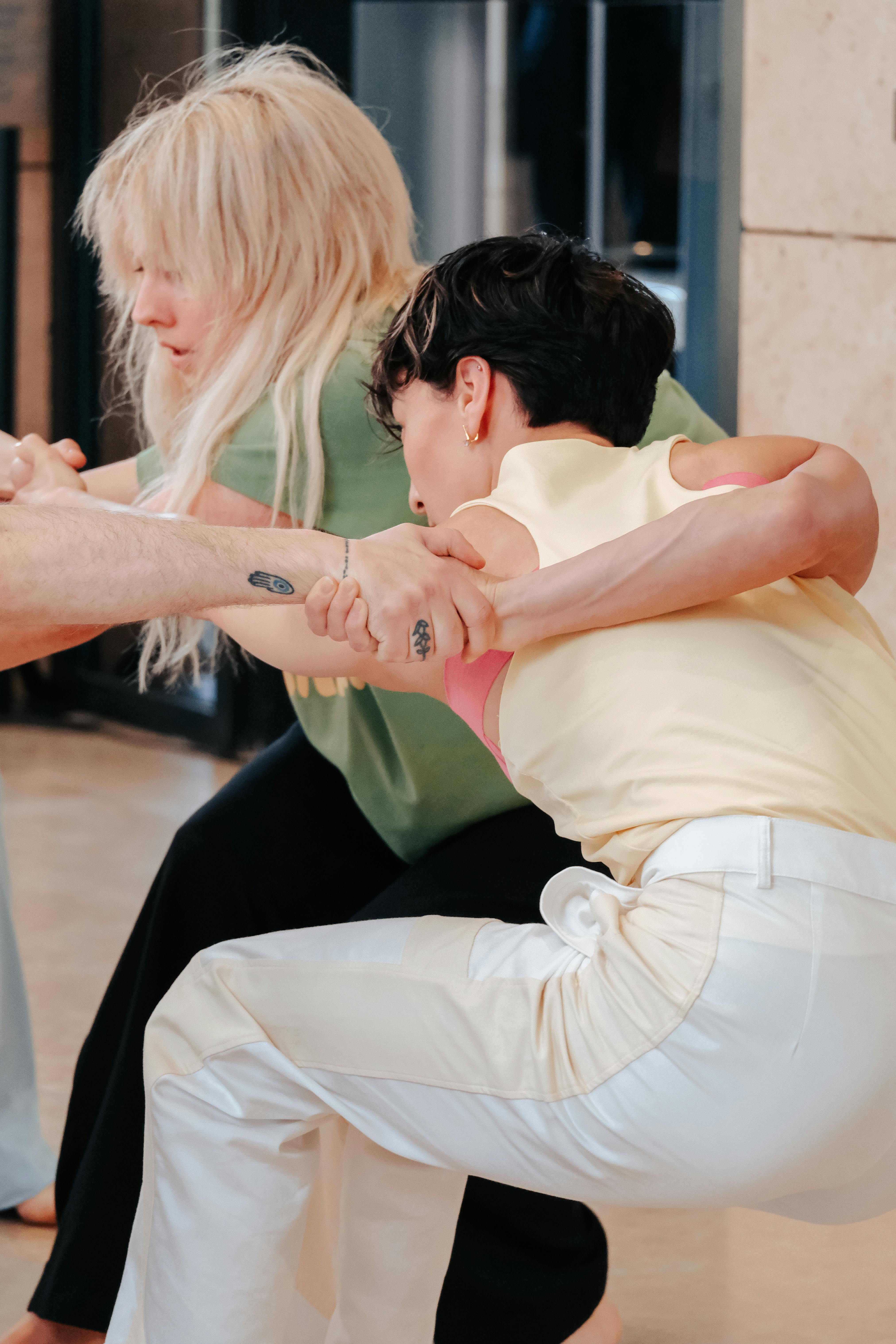 Six People in Black Matching Clothes Dancing at Daytime · Free Stock Photo