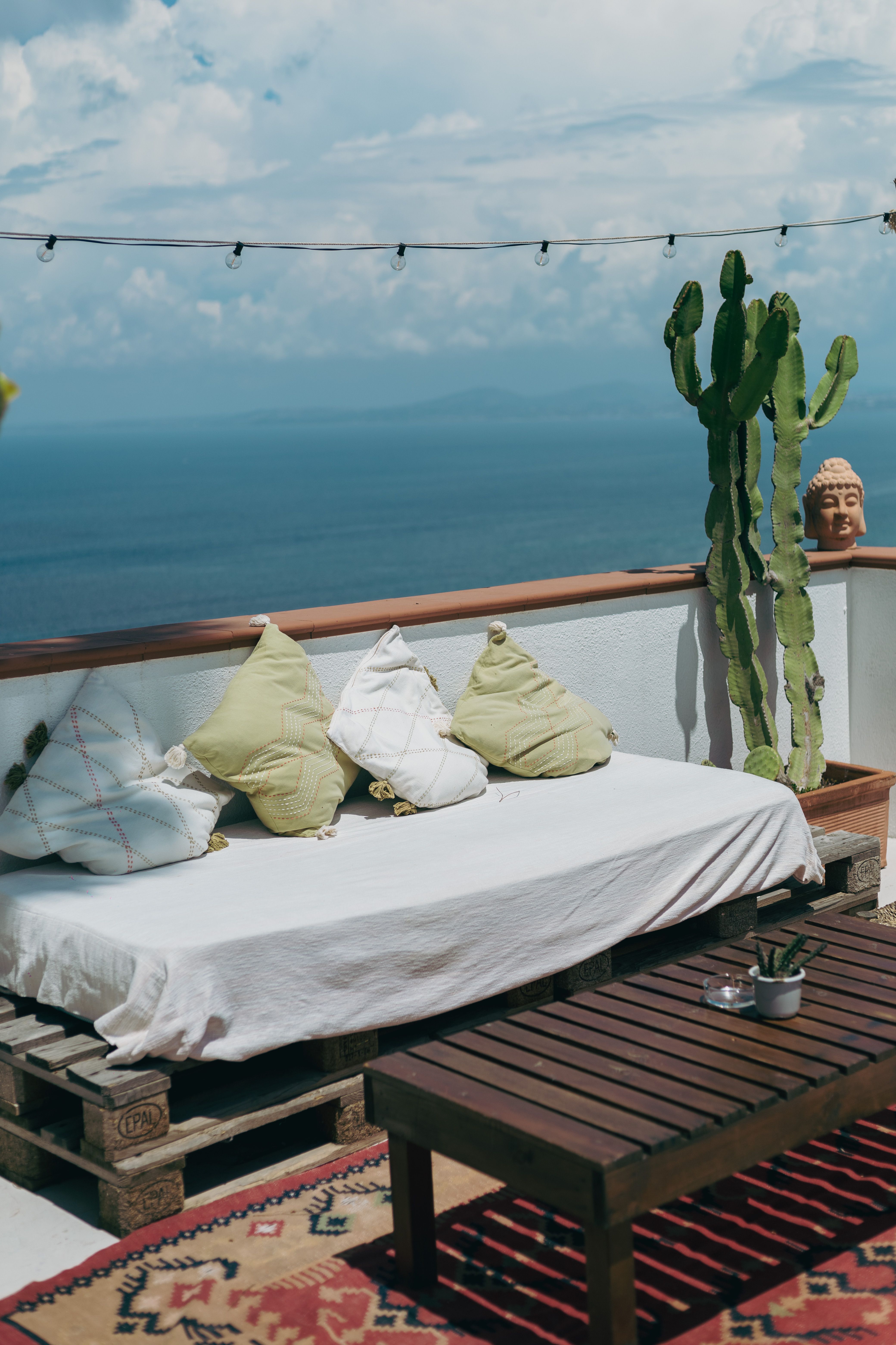 Sofa on a Terrace by the Sea · Free Stock Photo