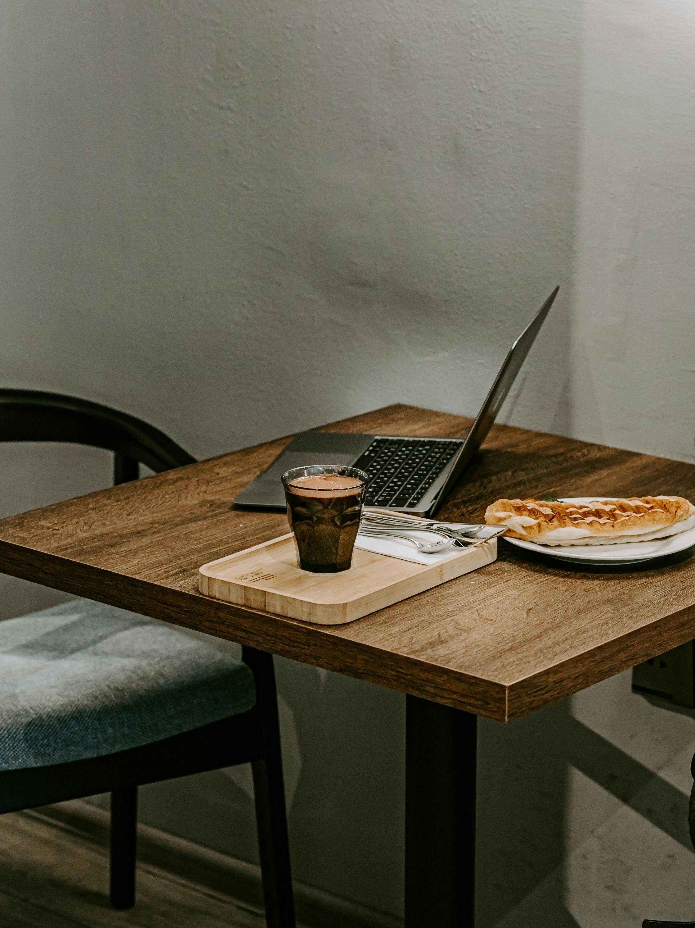 Laptop and Food on Table · Free Stock Photo