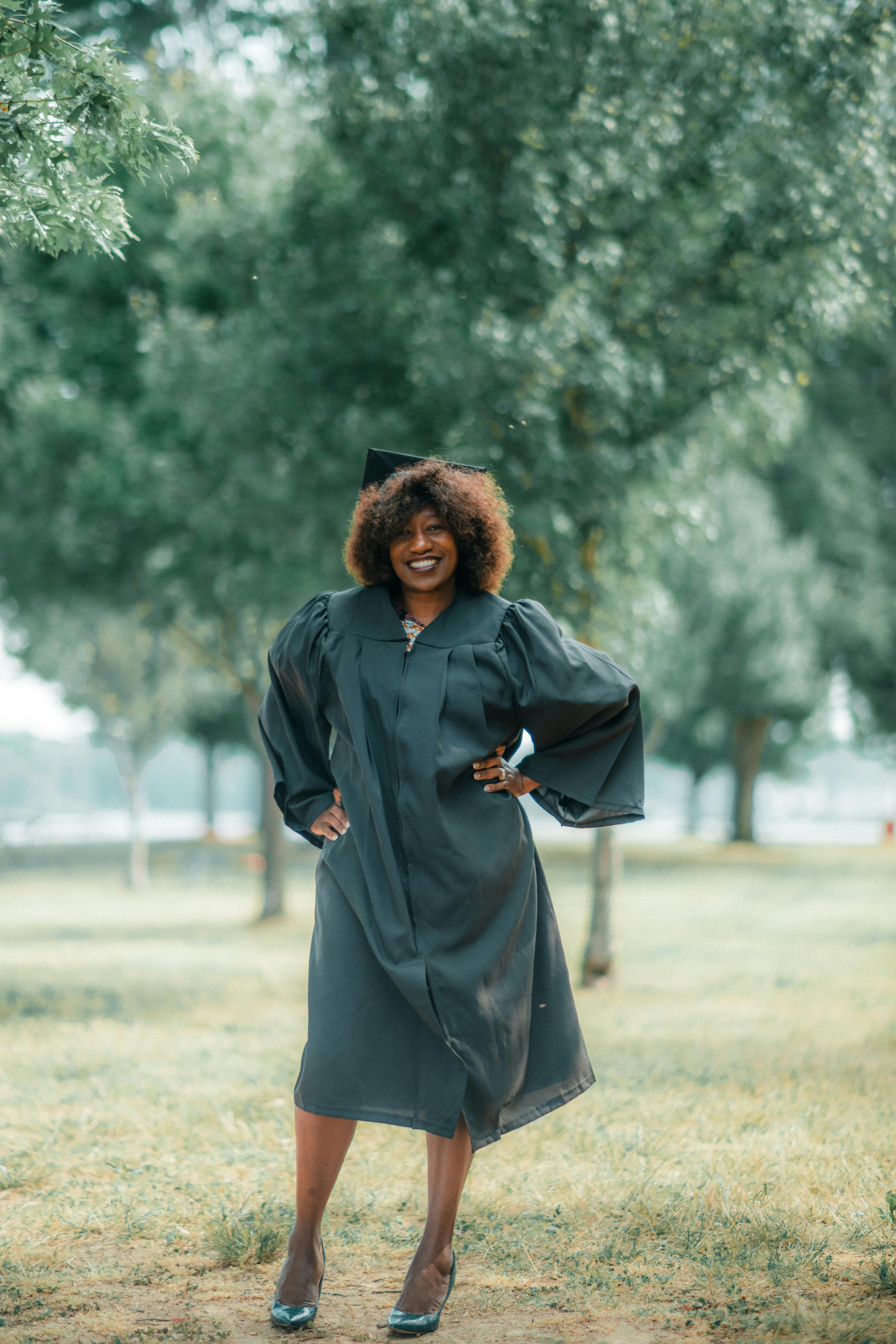 Woman in a Graduation Gown · Free Stock Photo