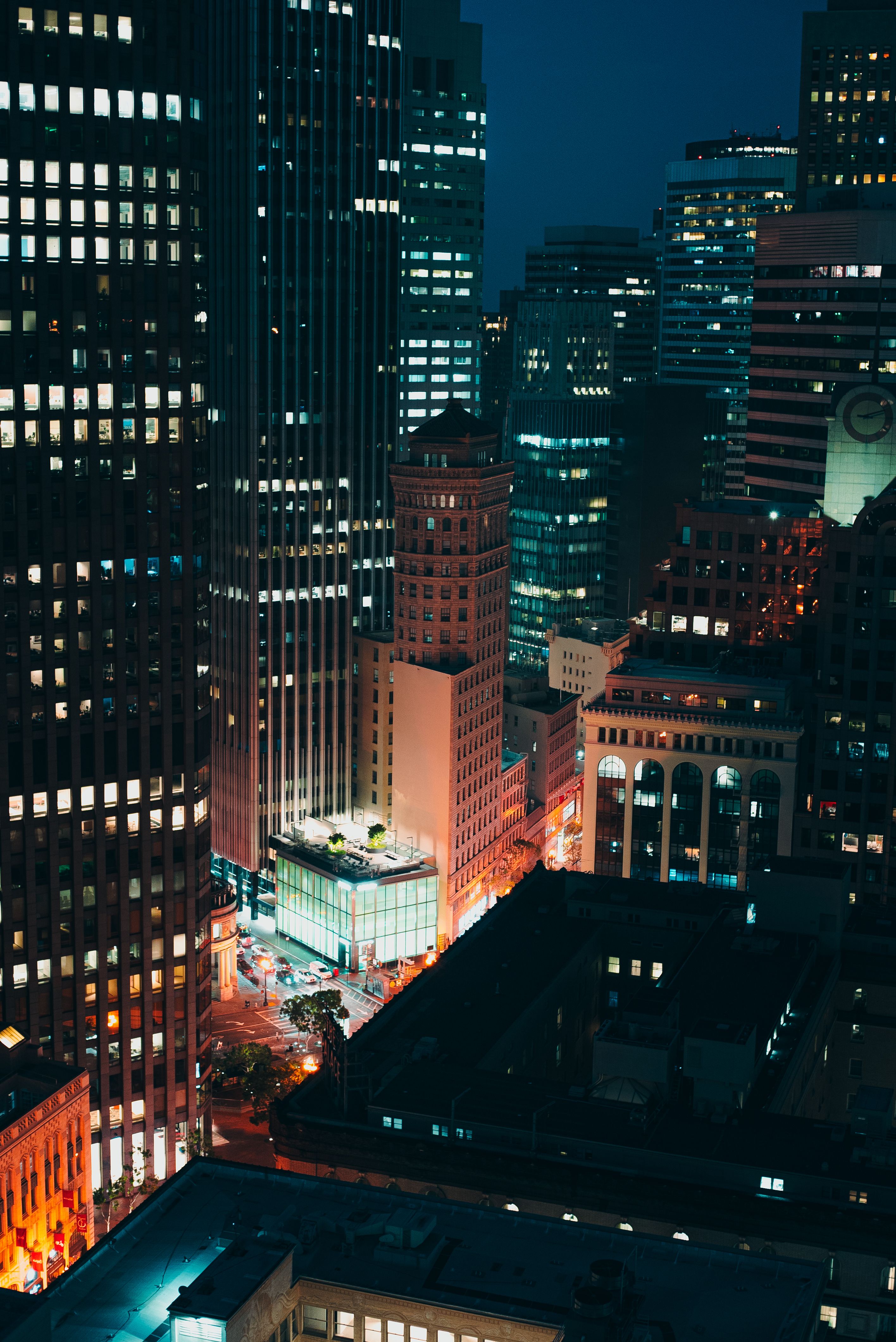 Skyscraper in City Illuminated at Night · Free Stock Photo