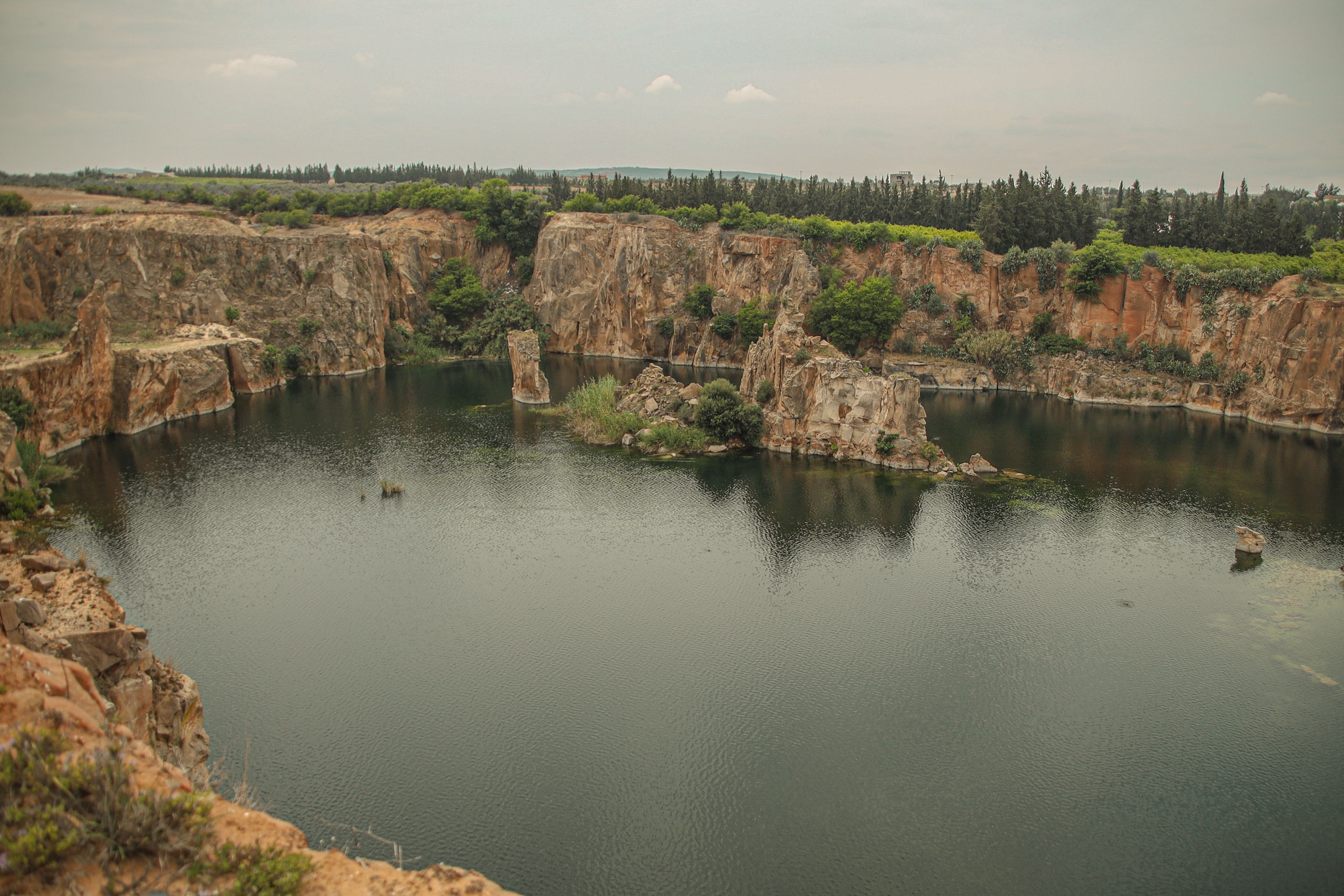 Landscape with Cliffs and Water Reservoir · Free Stock Photo