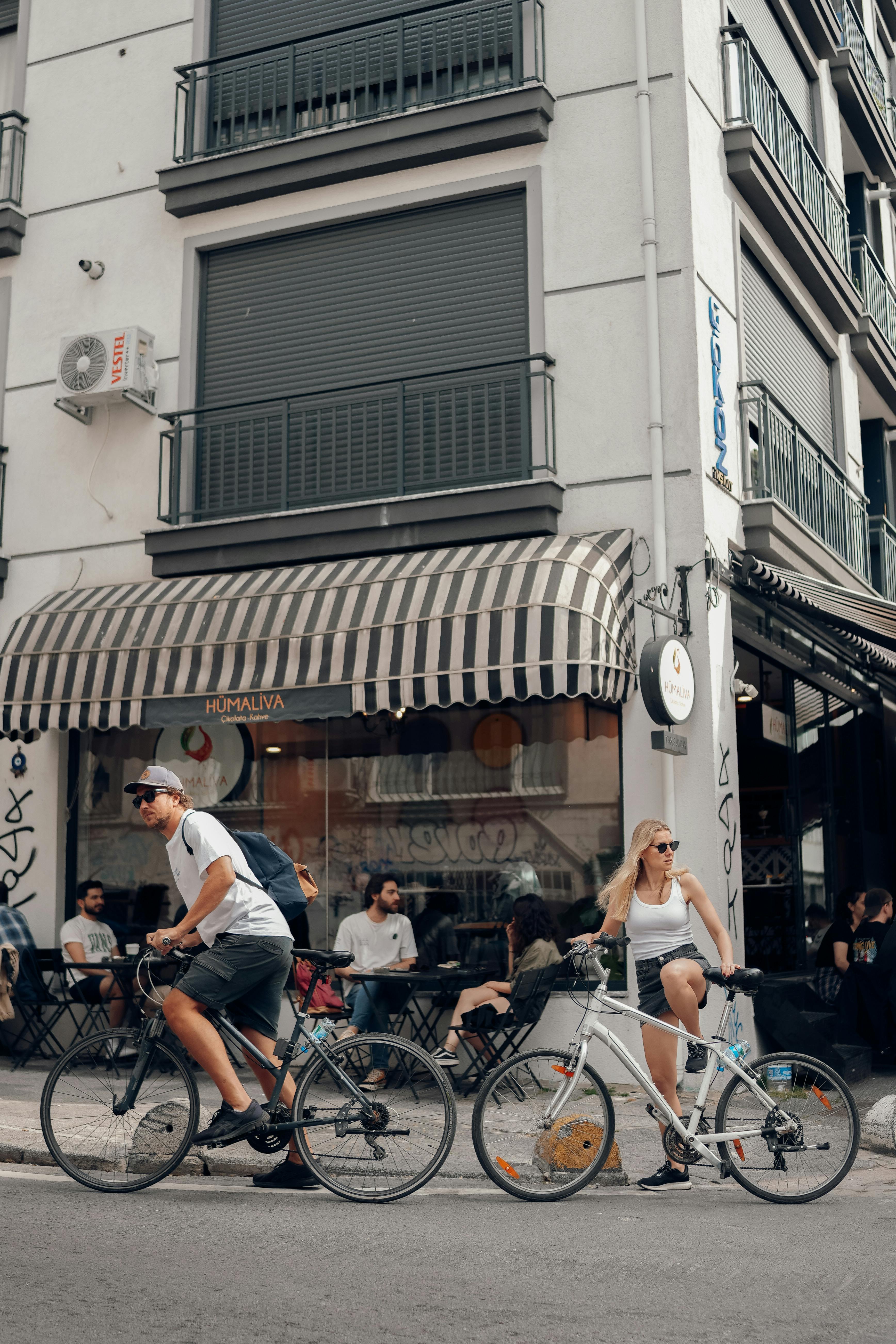 Woman Hugging Man on Bicycle · Free Stock Photo