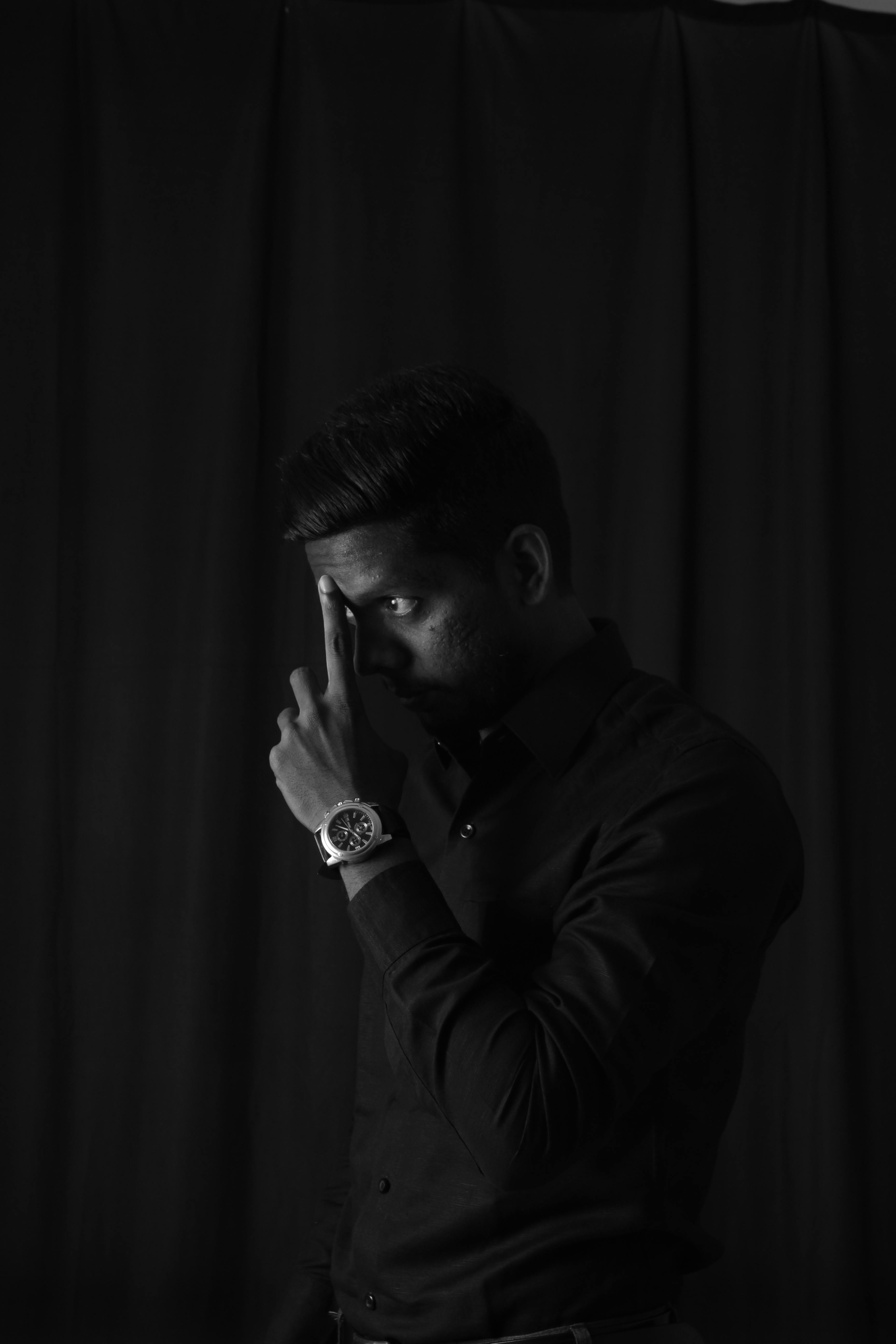 Man Pointing At His Forehead · Free Stock Photo