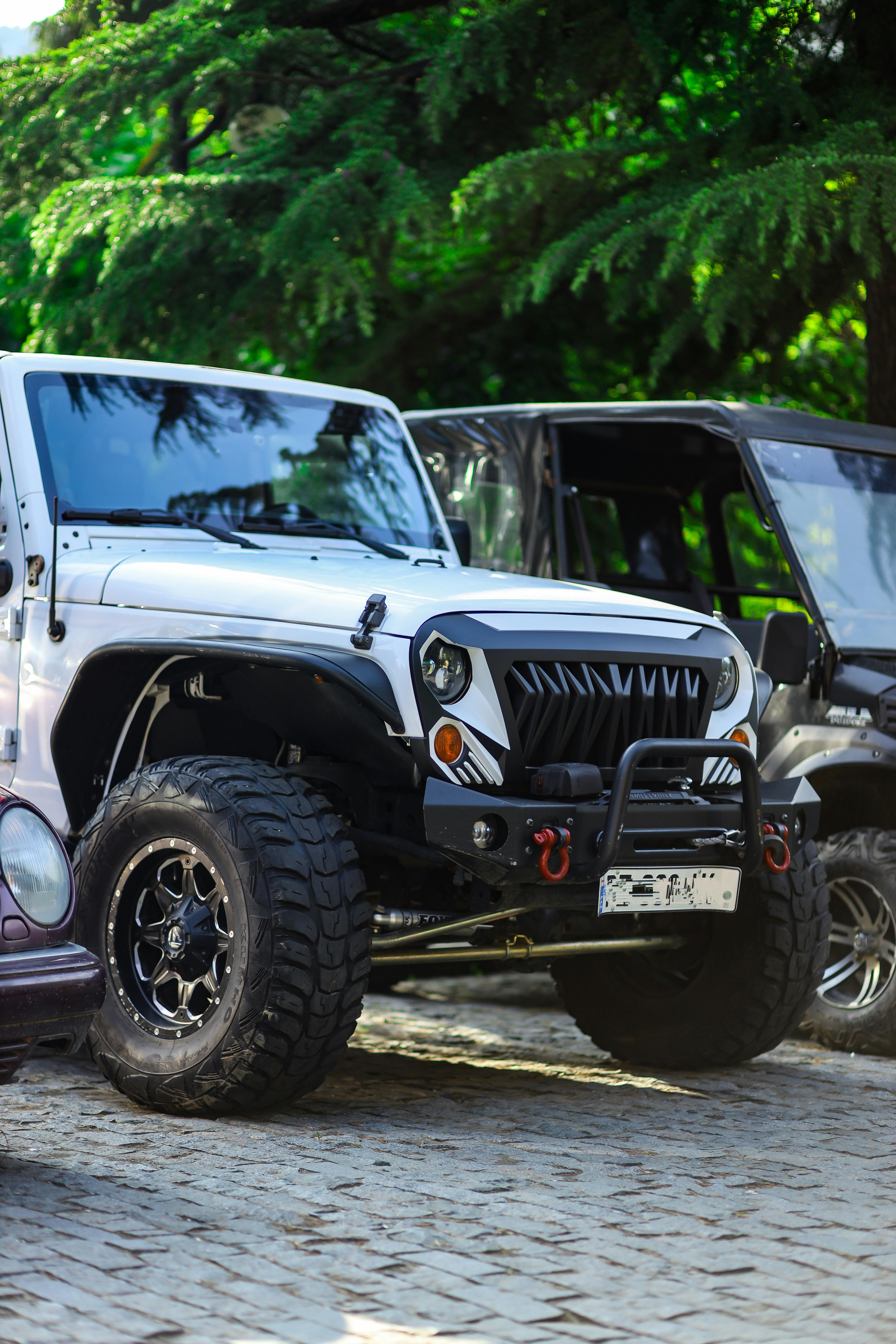 Modern Off Road Cars on a Parking Lot · Free Stock Photo