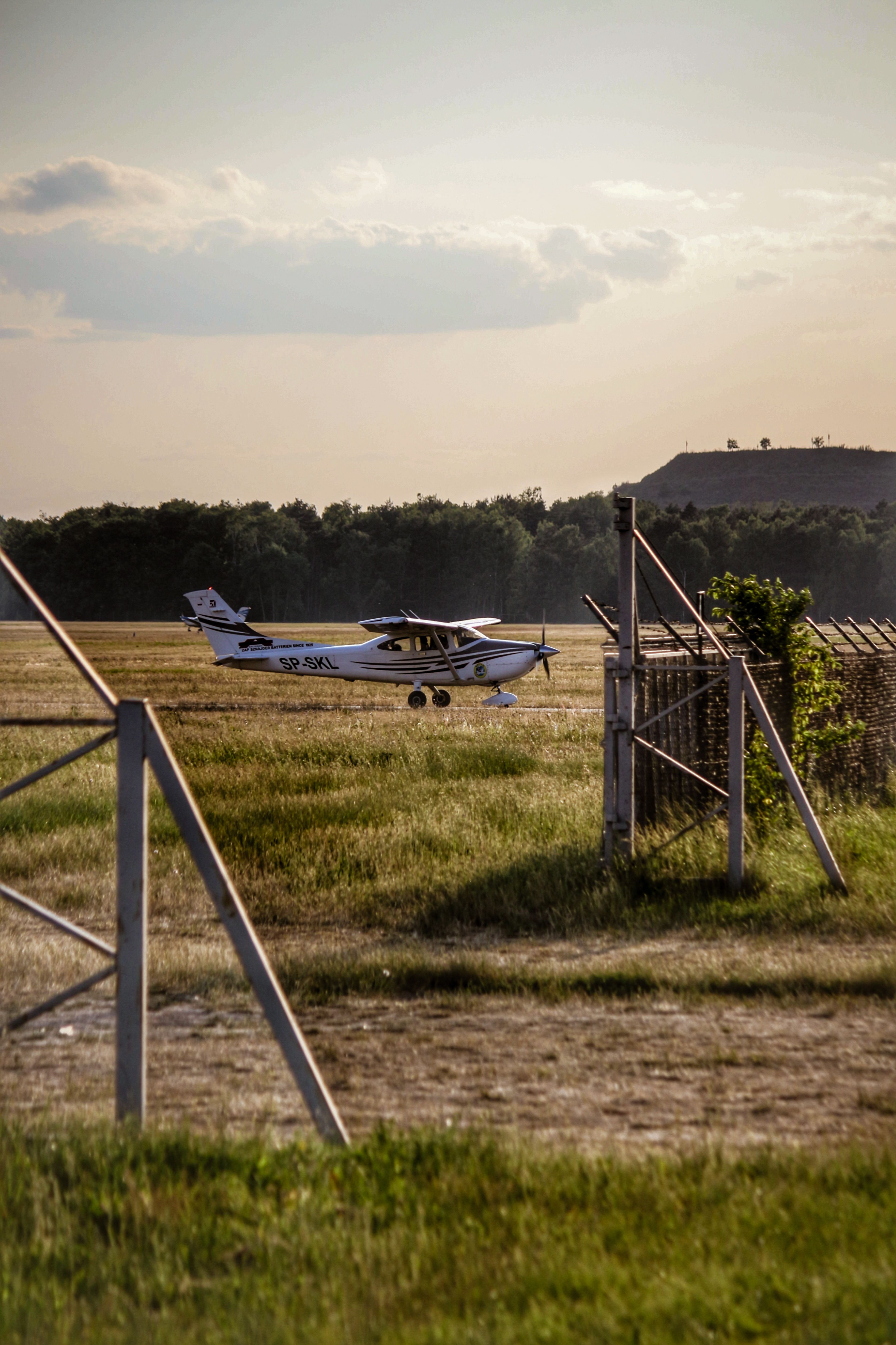 A Plane on a Grass Field · Free Stock Photo