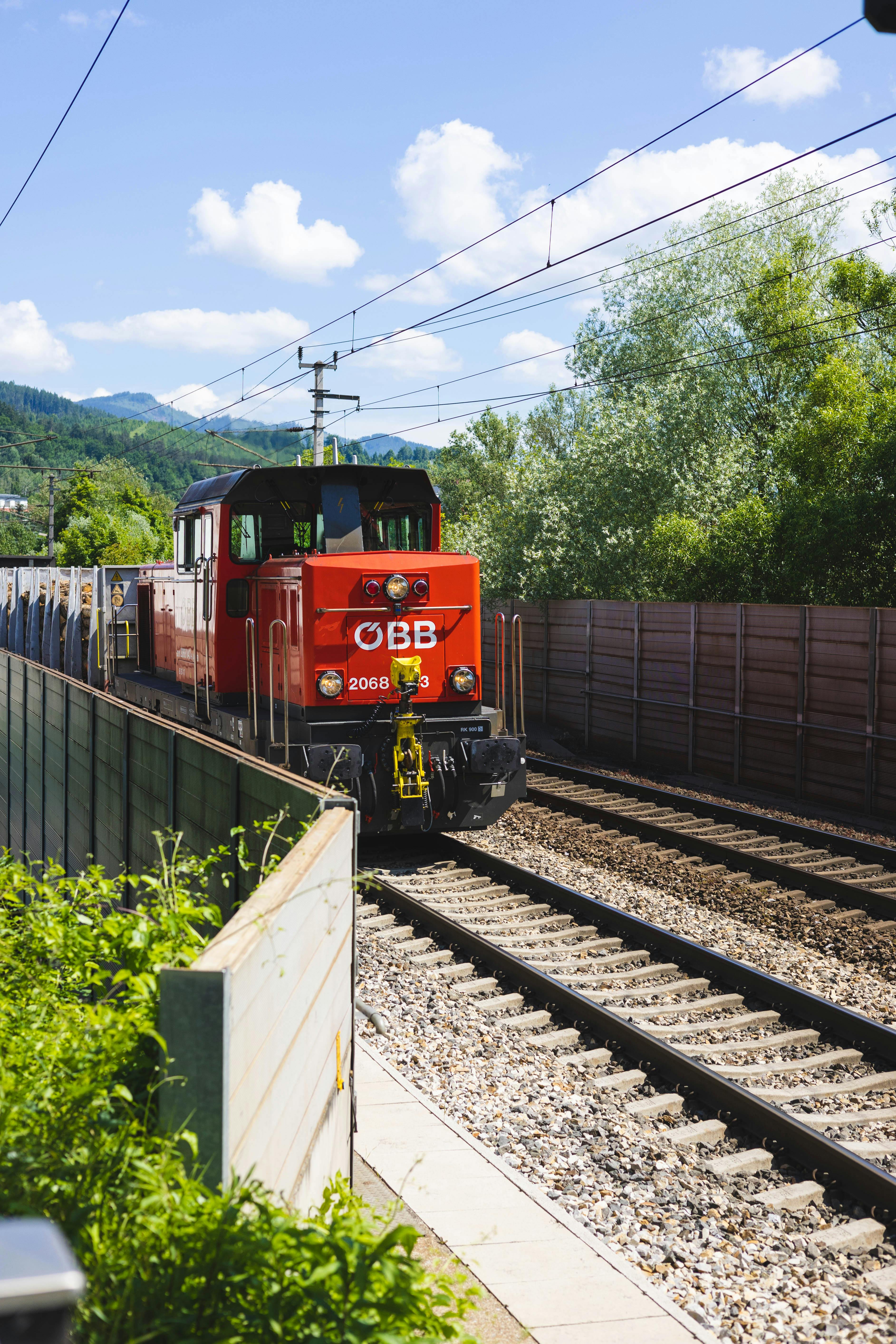 Retro Locomotive on Tracks · Free Stock Photo
