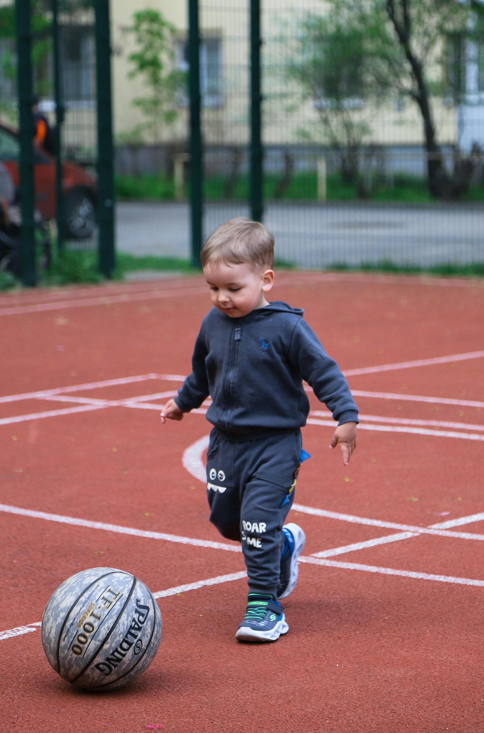 Toddler Kicking A Ball Photos, Download The BEST Free Toddler Kicking A ...