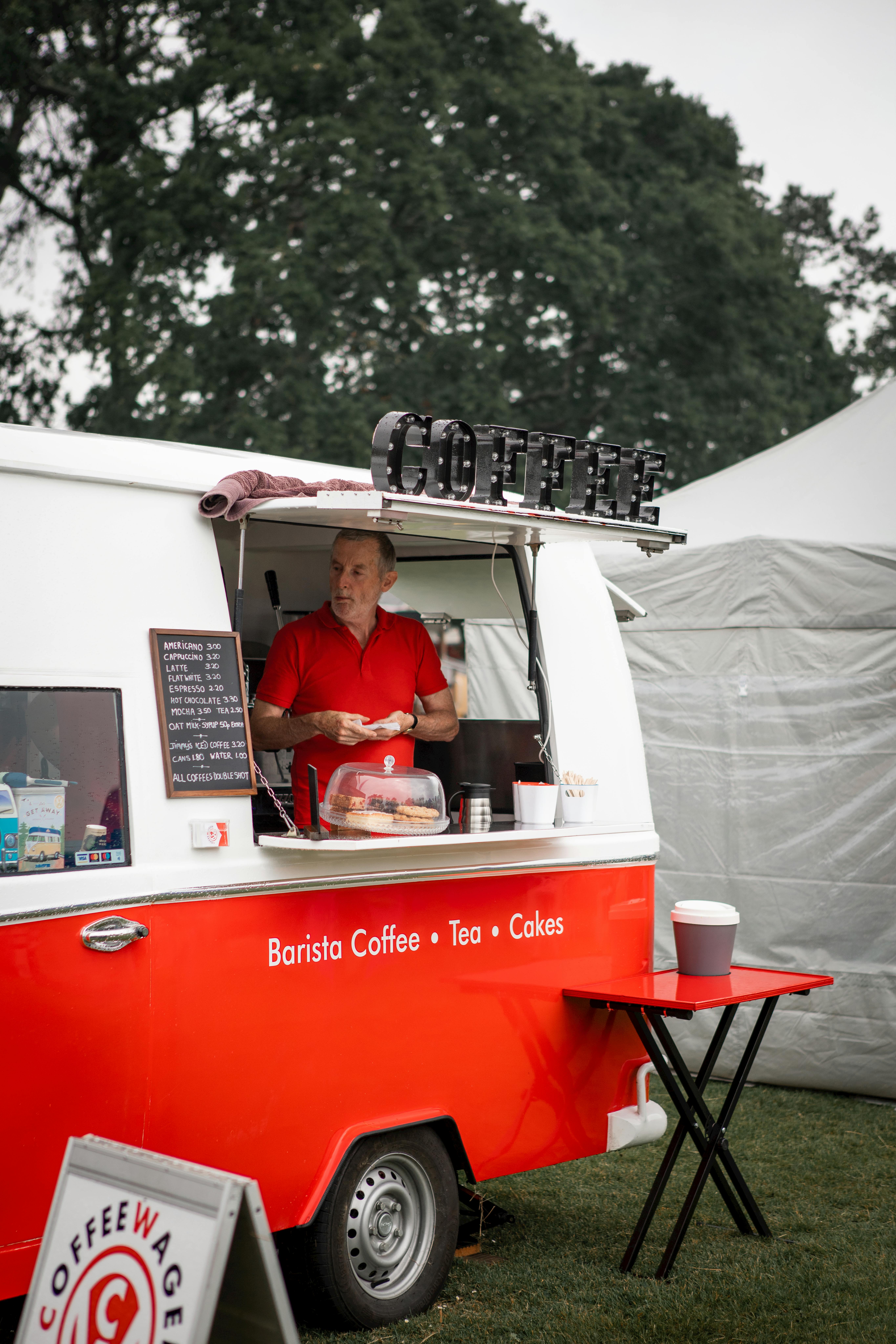 Man Working in Food Truck · Free Stock Photo