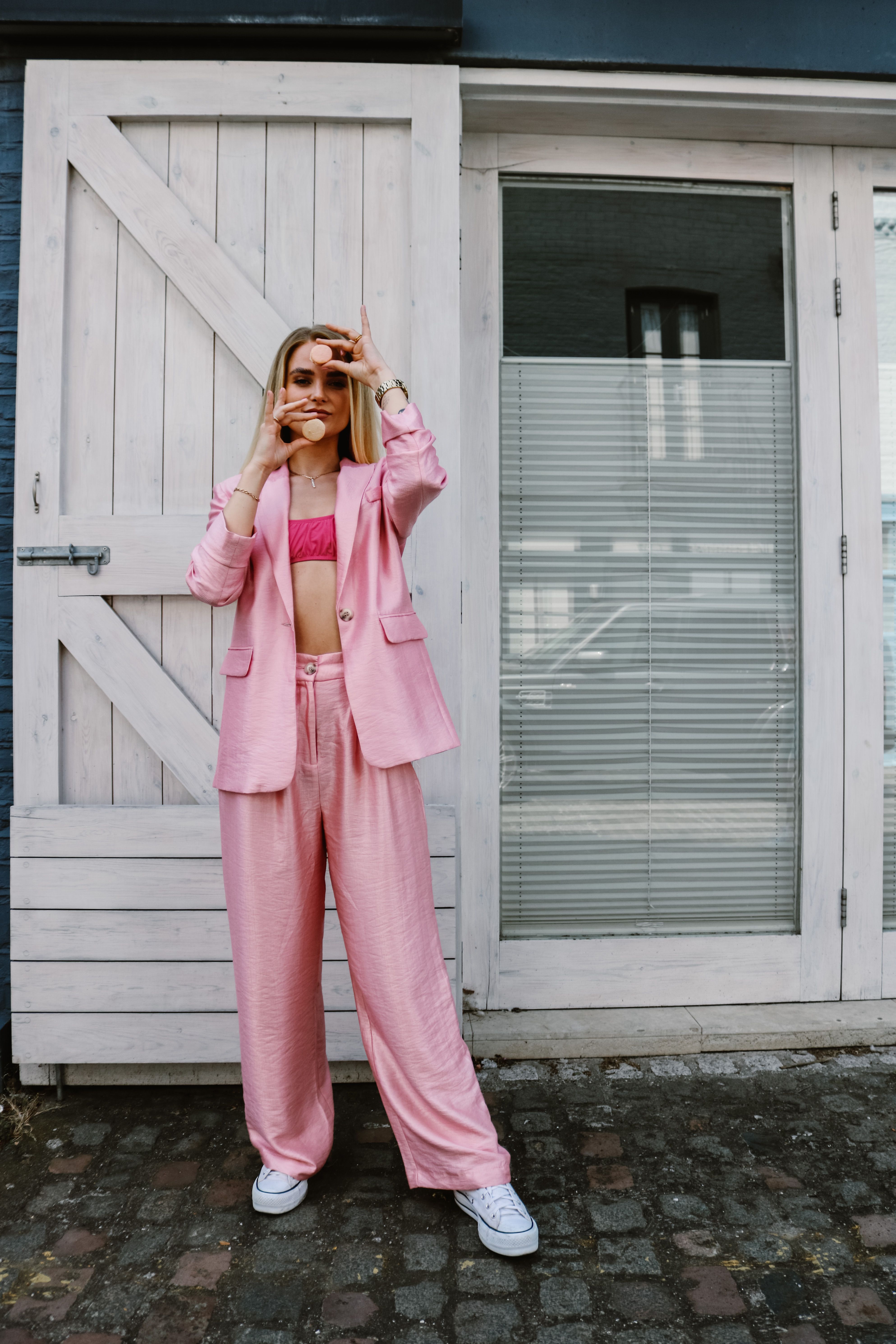 Woman Posing in Pink Clothes · Free Stock Photo
