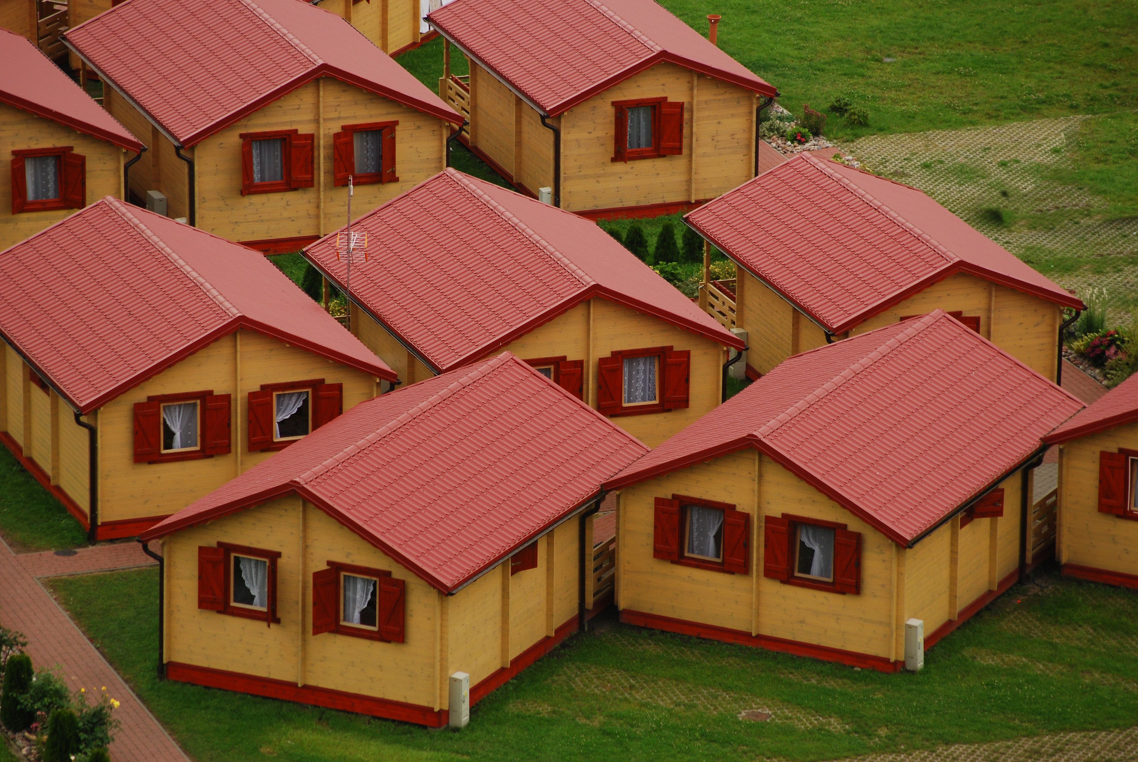 Brown Beige and Red Concrete House · Free Stock Photo