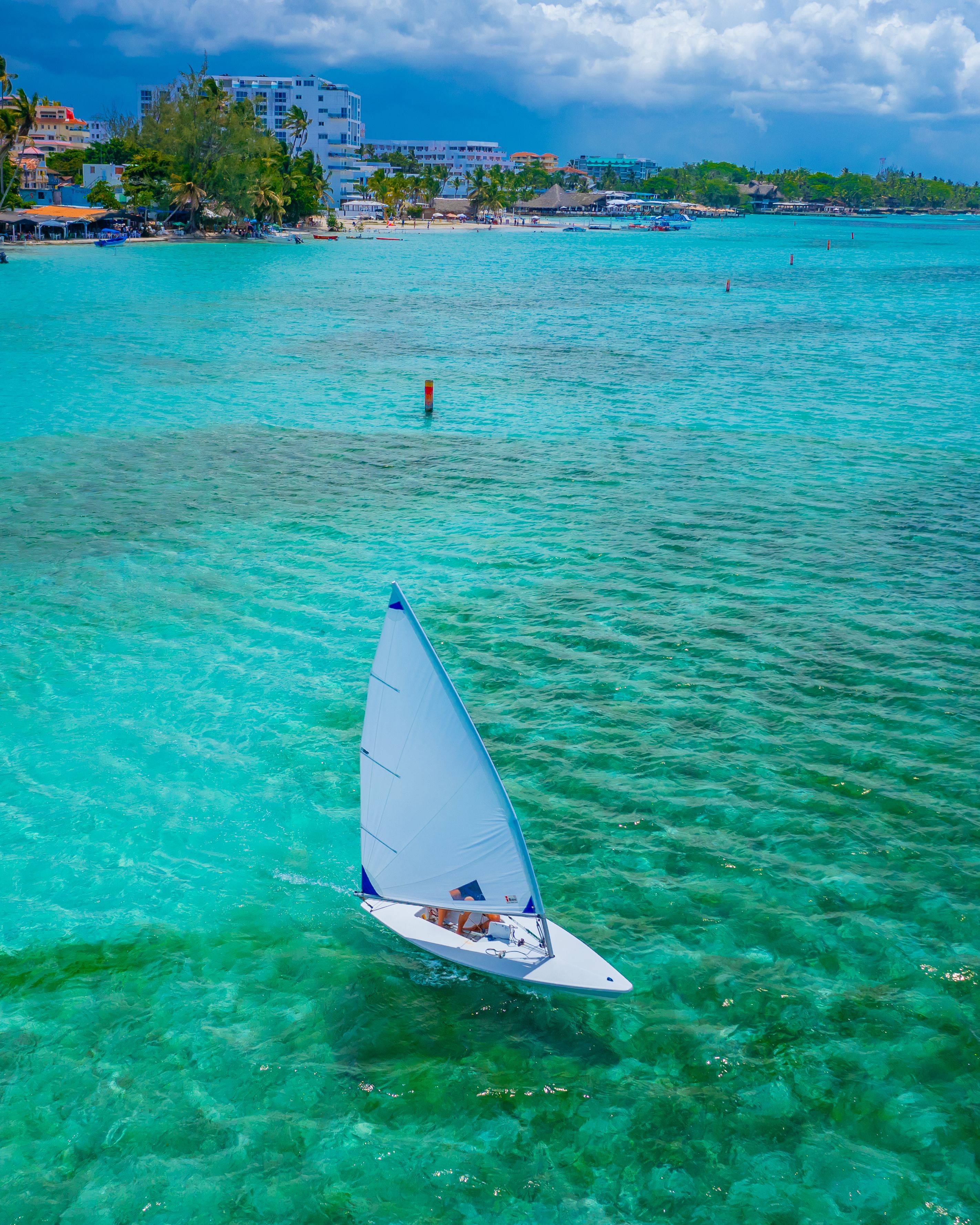 Sailboat Sailing on Blue Sea Coast · Free Stock Photo