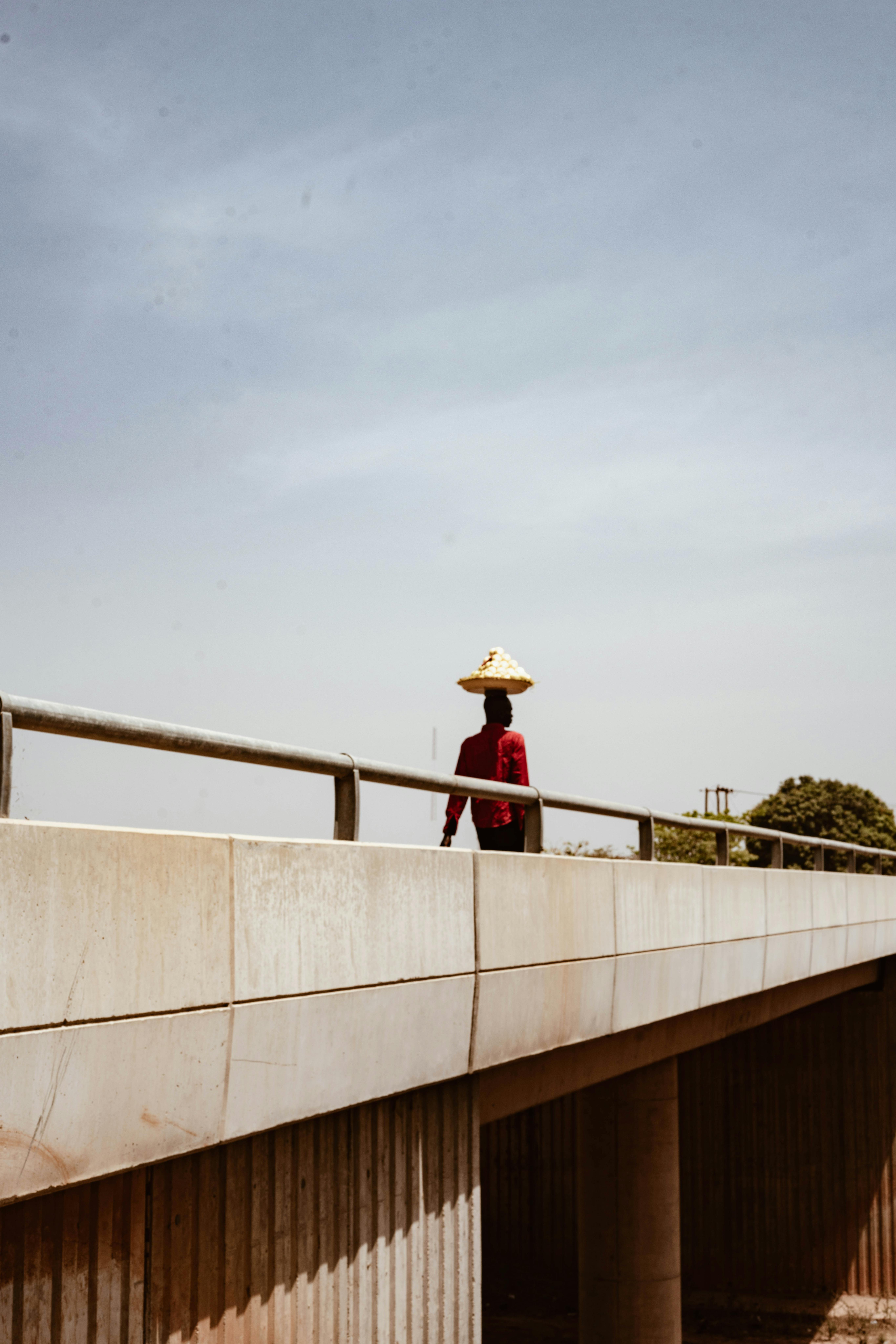 Man Carrying Tray on Head · Free Stock Photo