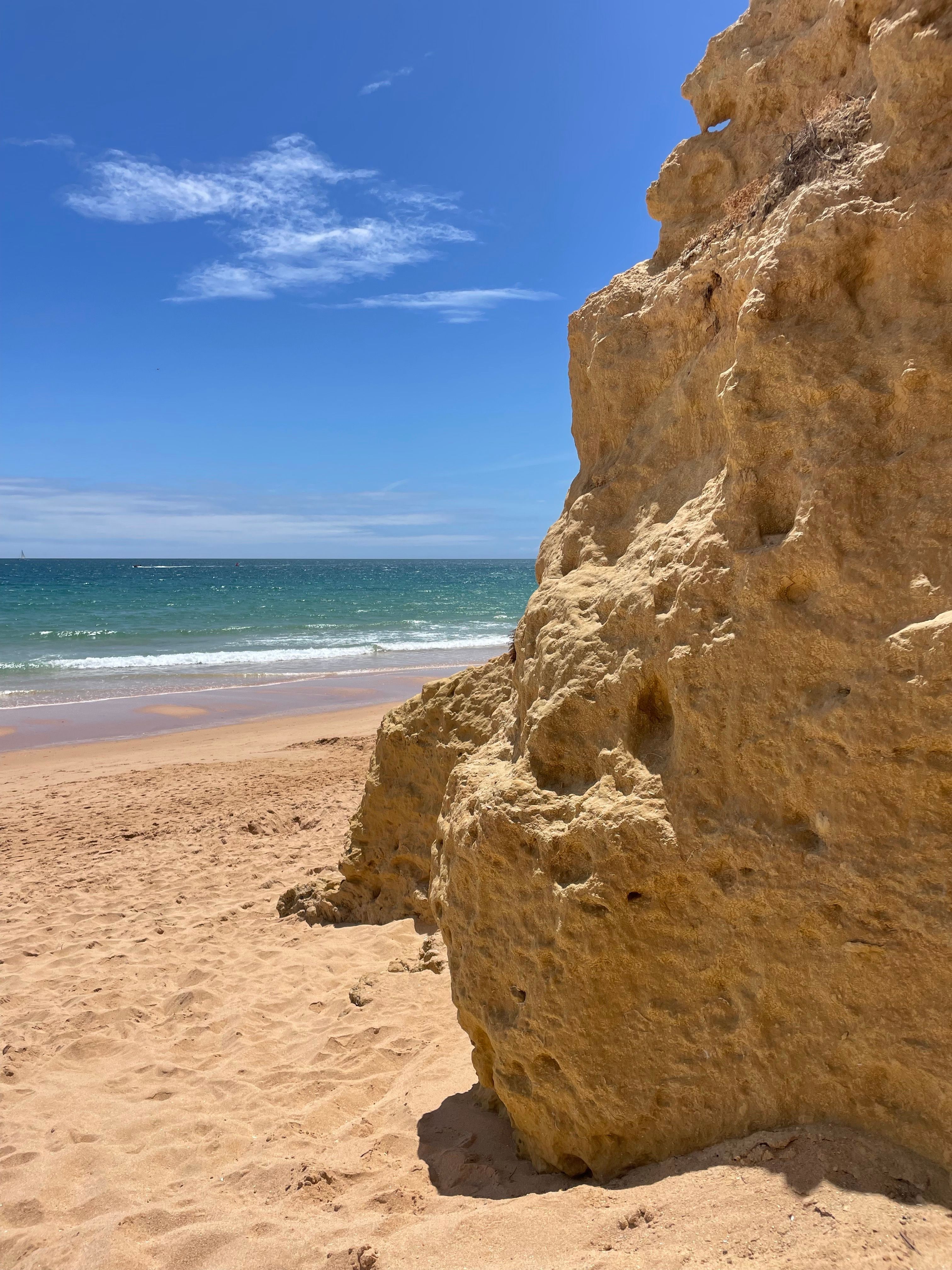 Sunlit Rock on Sea Shore · Free Stock Photo
