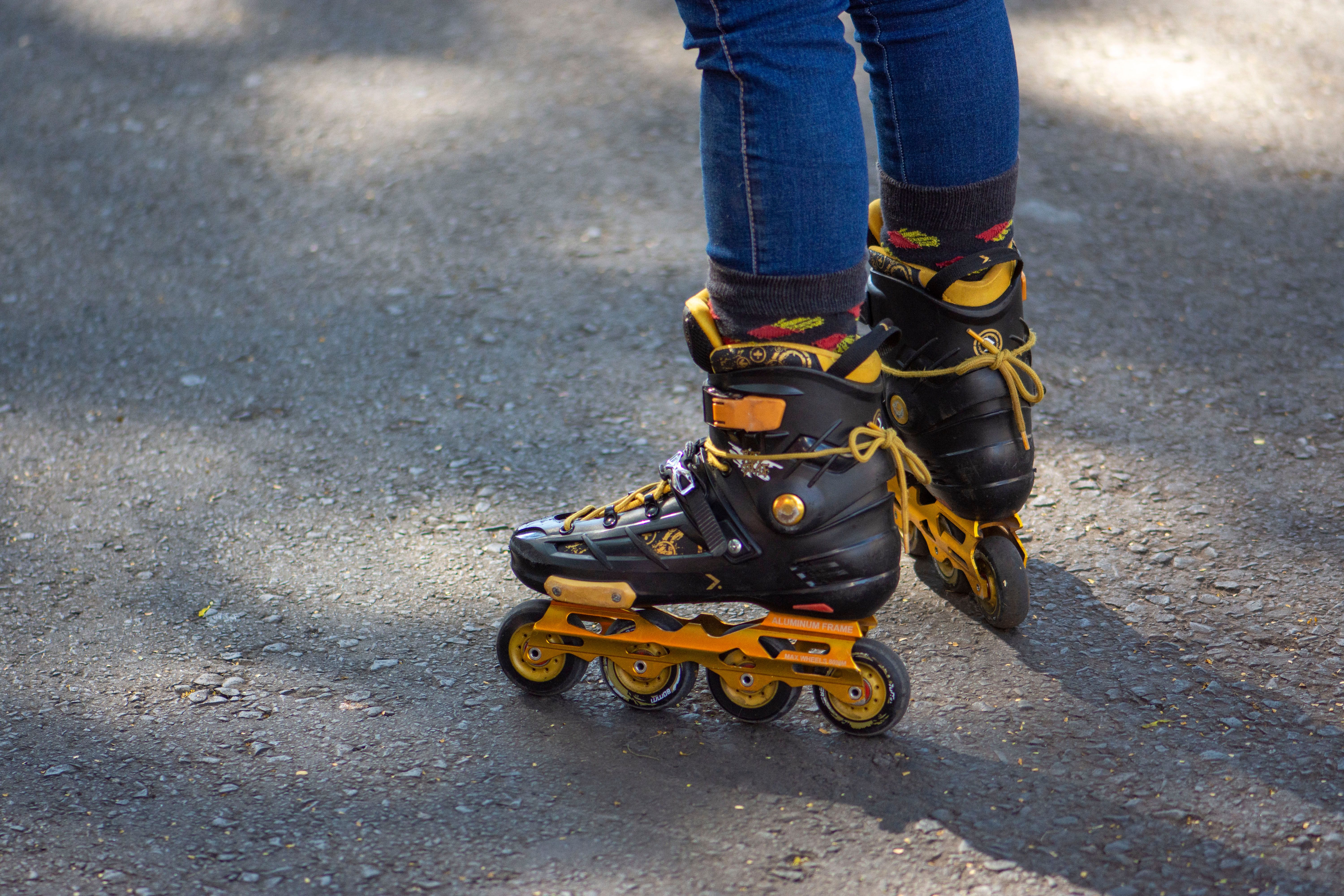 Legs of Person on Roller Skates · Free Stock Photo