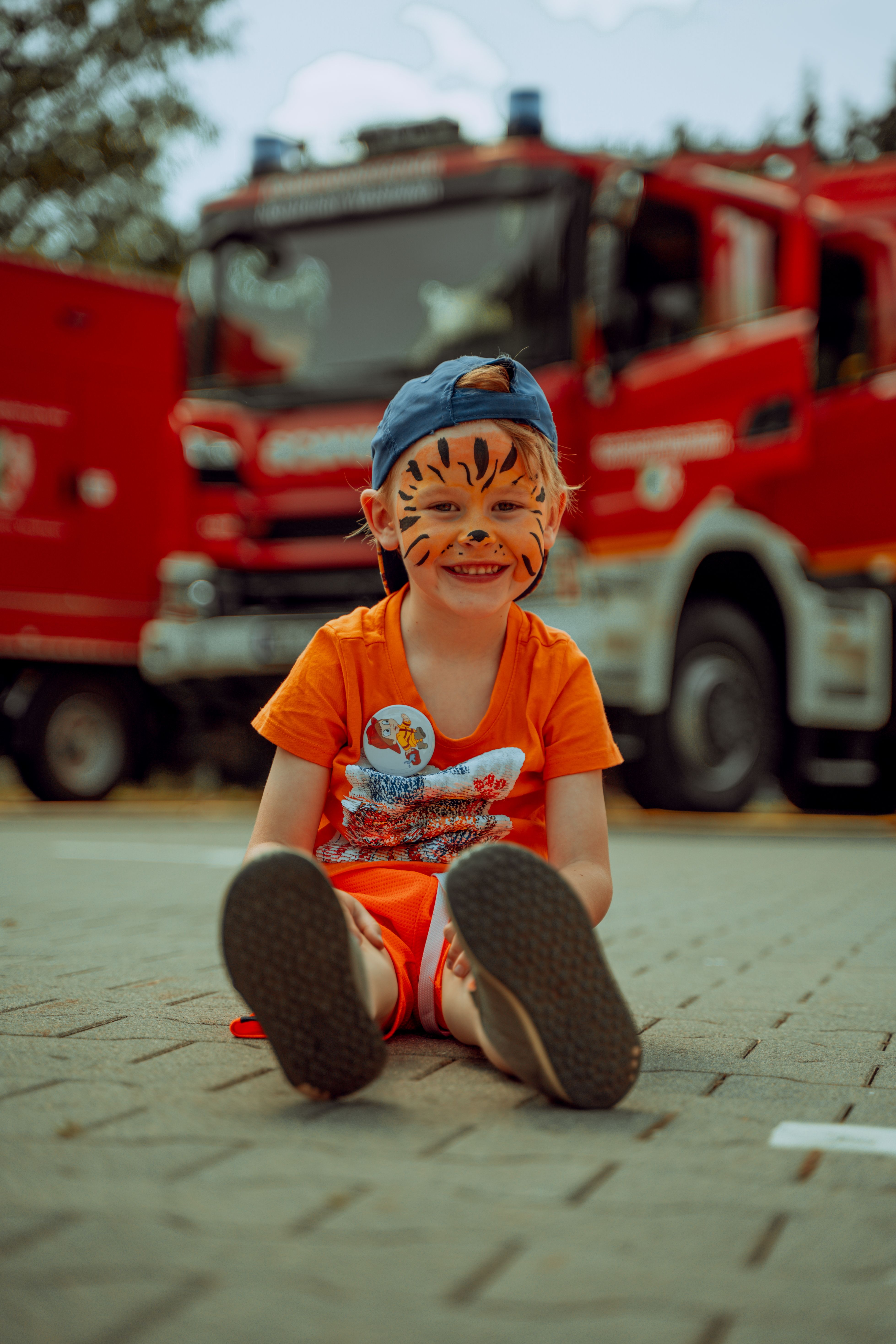 Smiling Boy with Tiger Painted Face · Free Stock Photo
