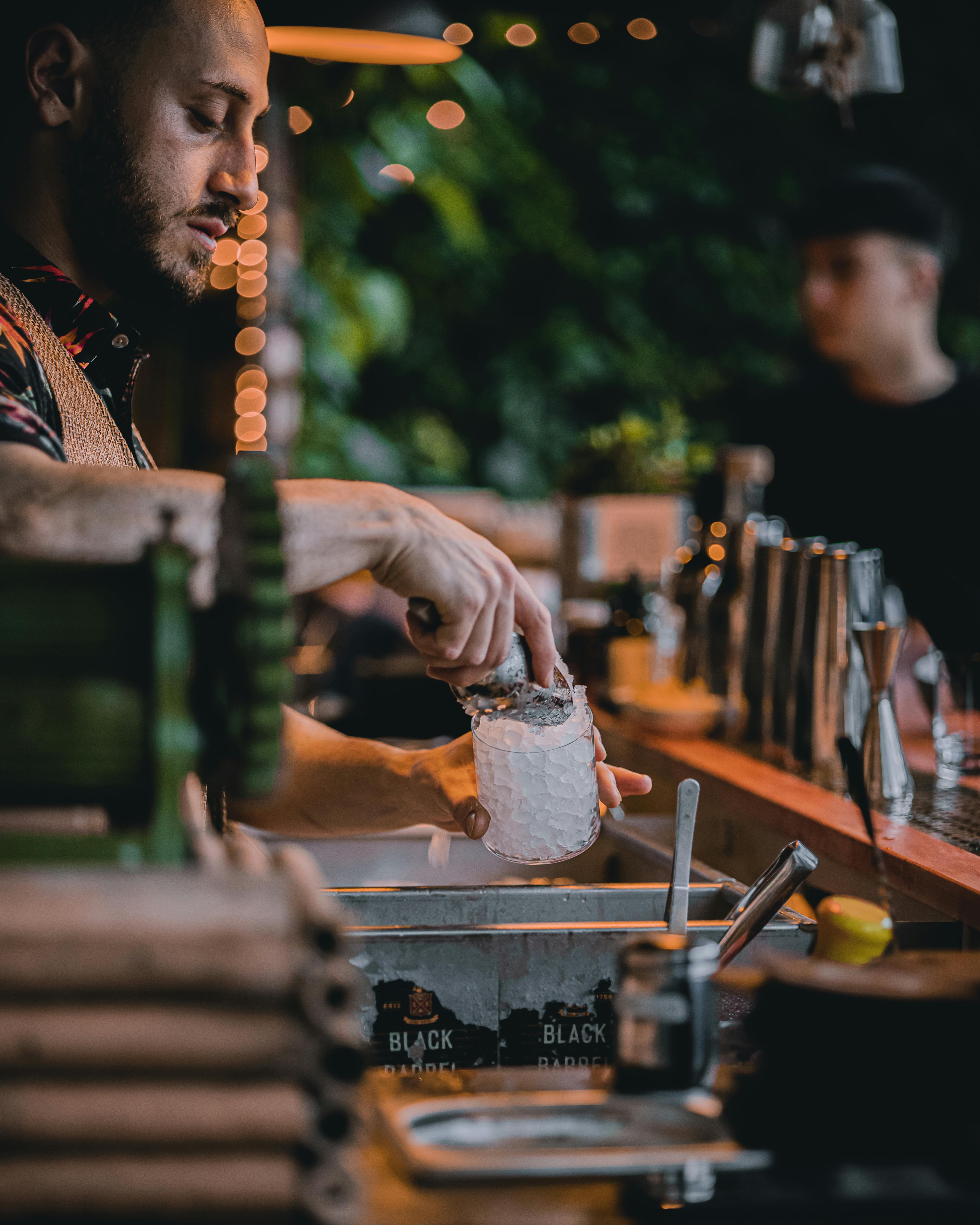 Man Working at a Bar · Free Stock Photo
