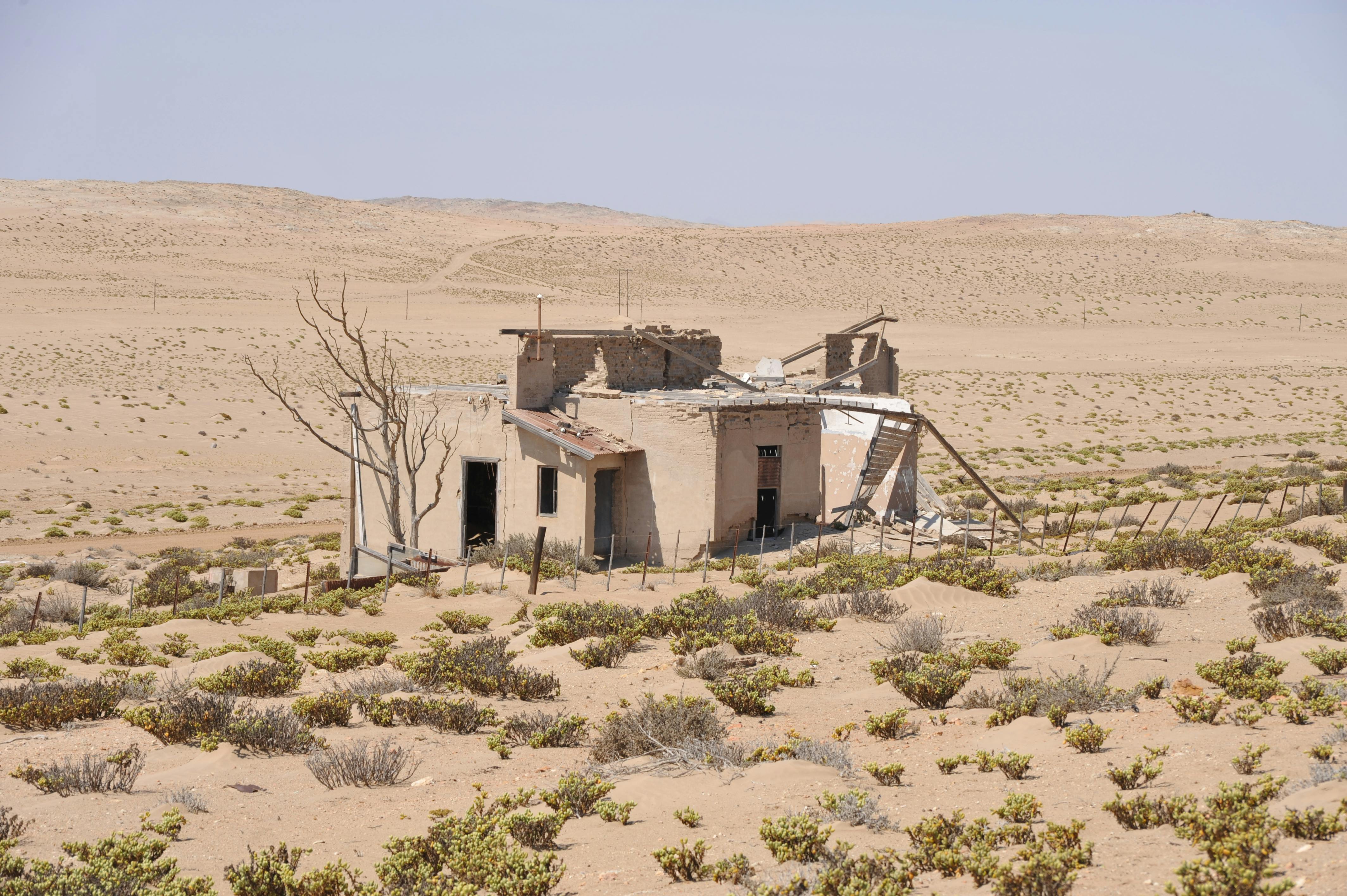 Arid Landscape Seen through an Arch · Free Stock Photo
