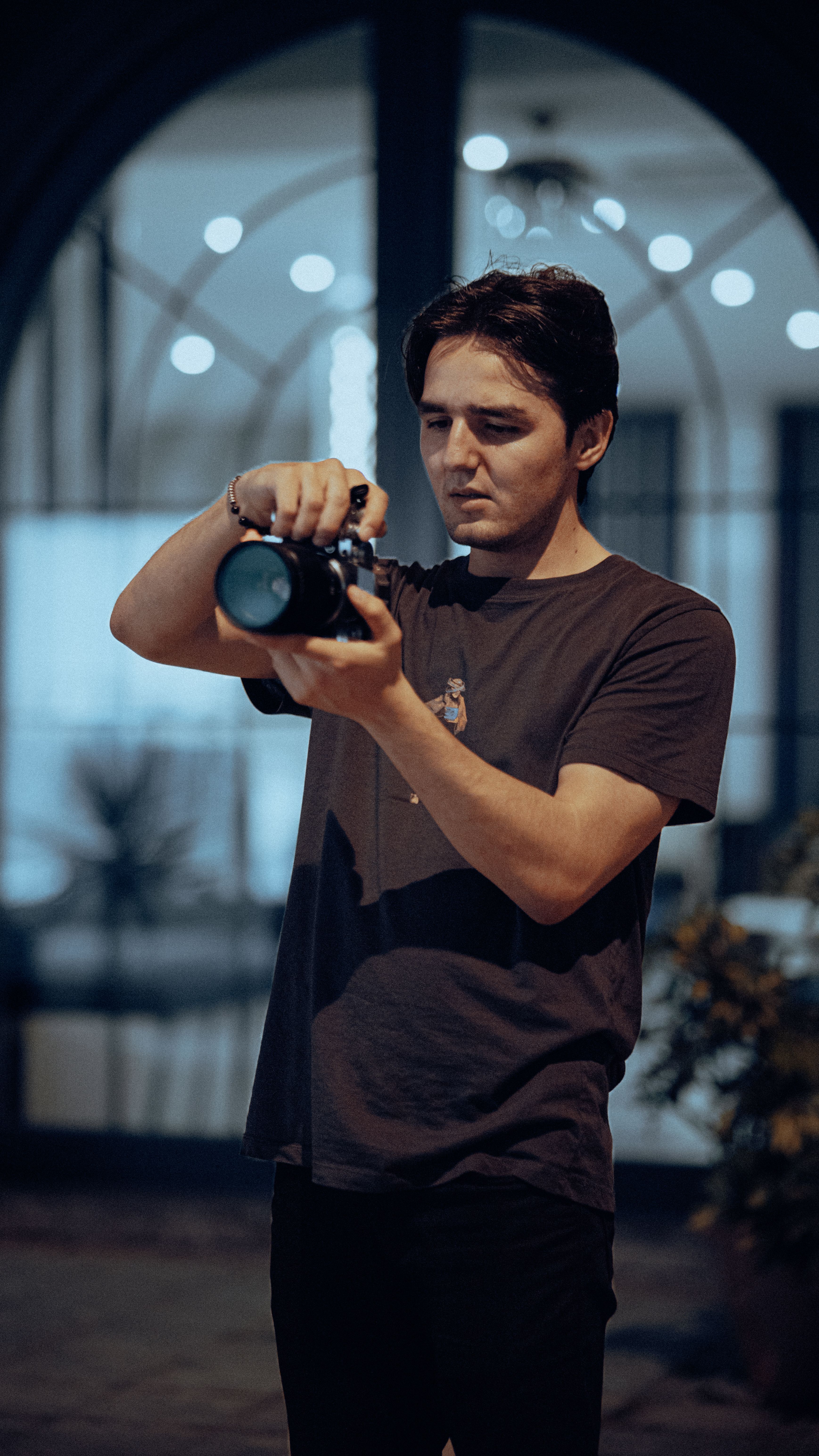 Man Looking at Camera Screen · Free Stock Photo
